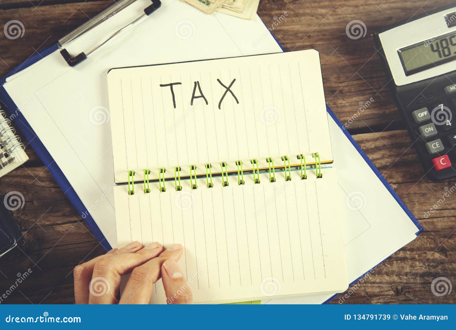 Woman hand tax text stock image. Image of writing, paper - 134791739