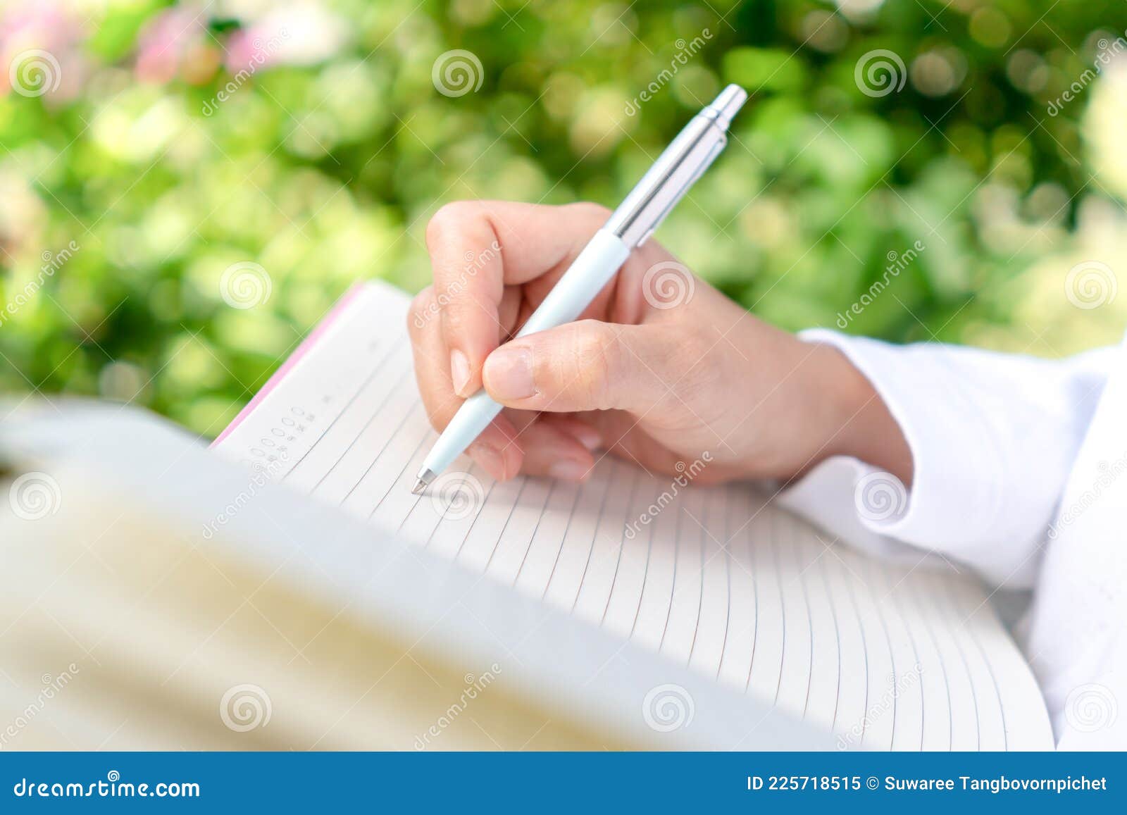Woman Hand Writing Down in Small White Memo Notebook for Take a Note ...