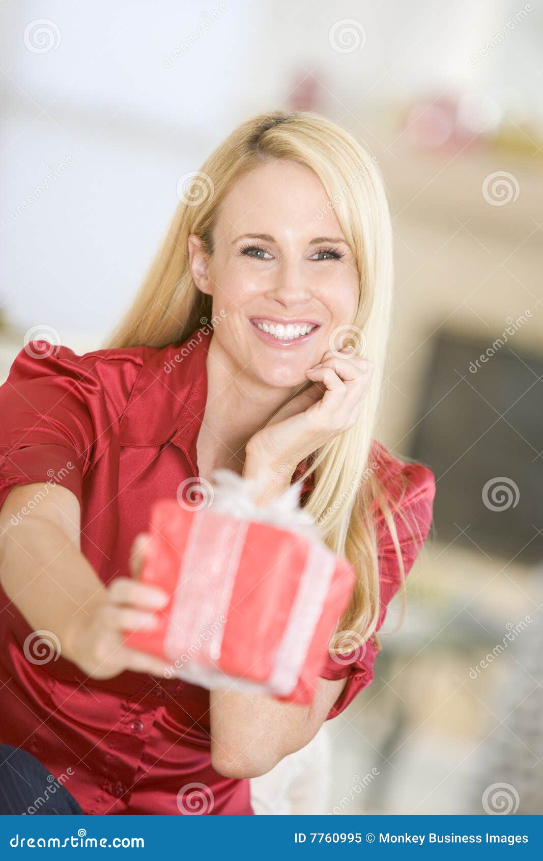 Woman Handing Out Christmas Present Photos - Free & Royalty-Free Stock ...