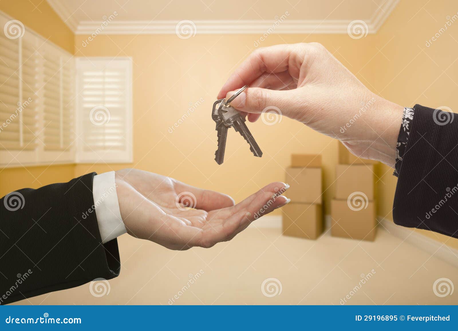 Woman Handing Over the House Keys Inside Empty Room Stock Image - Image ...