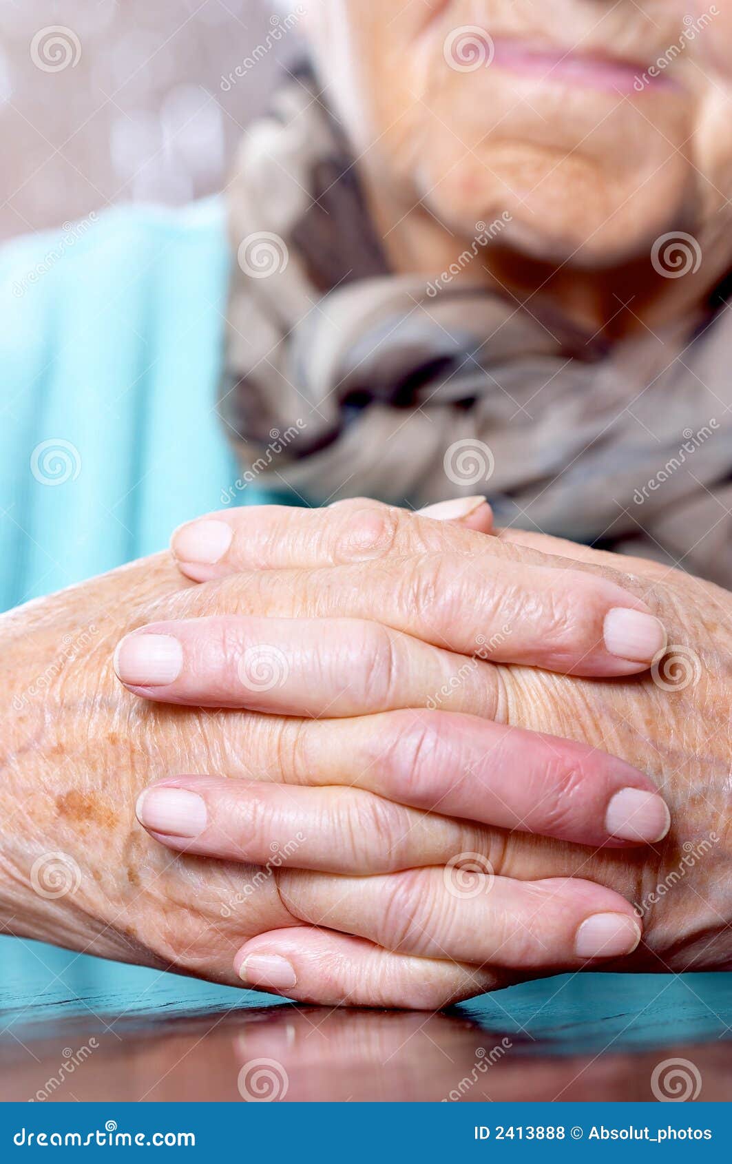 Woman with hands clasped stock photo. Image of wrinkles - 2413888