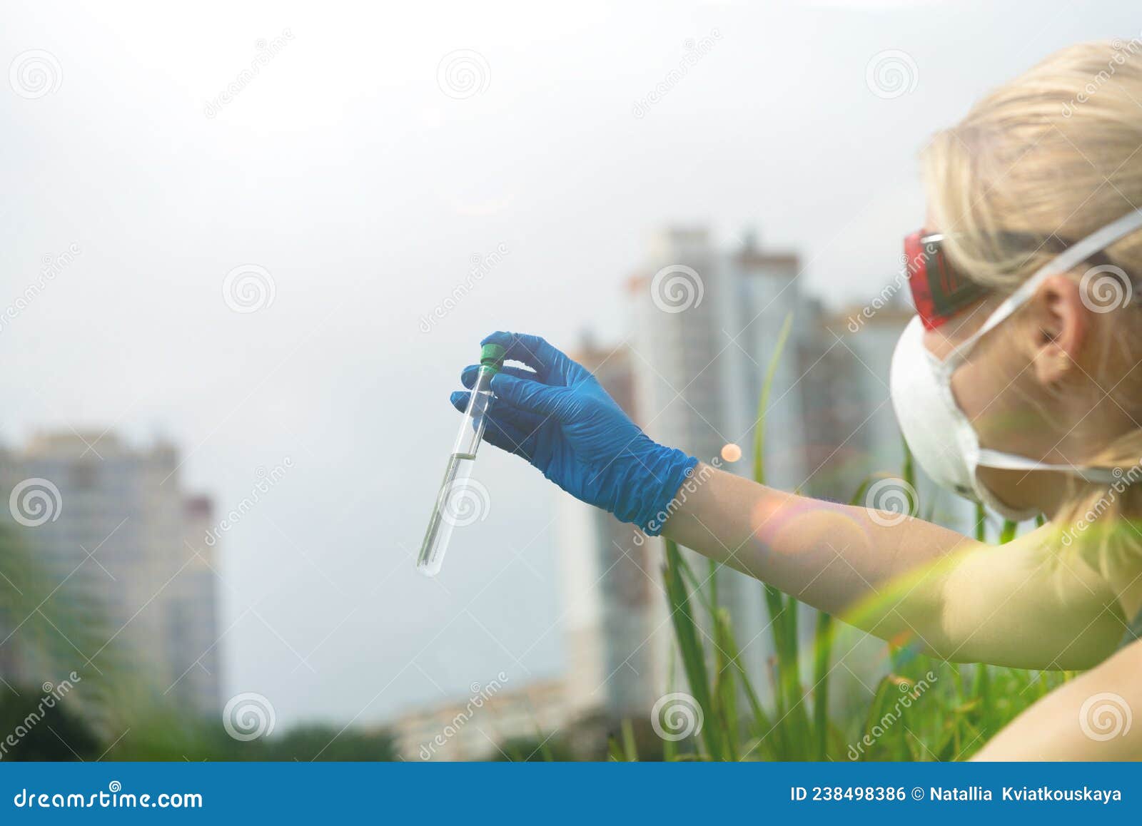 Woman with Hands in Gloves Holds a Glass with a Sample of Water ...