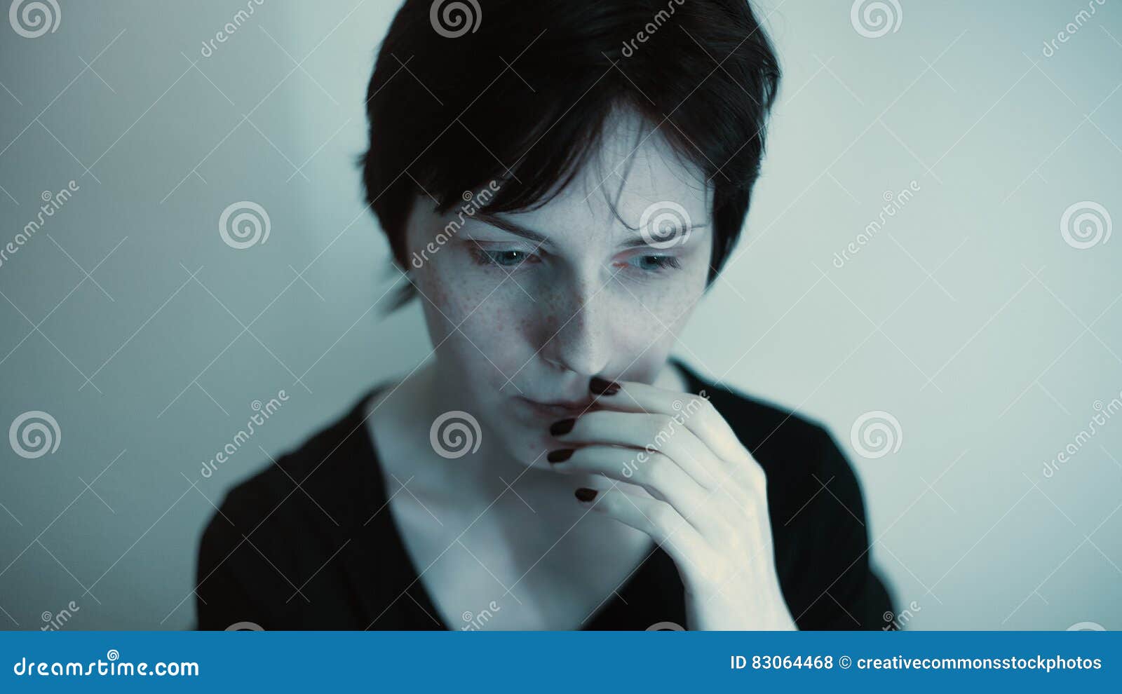 Woman Hands On Her Lips In Black Top Picture. Image: 83064468