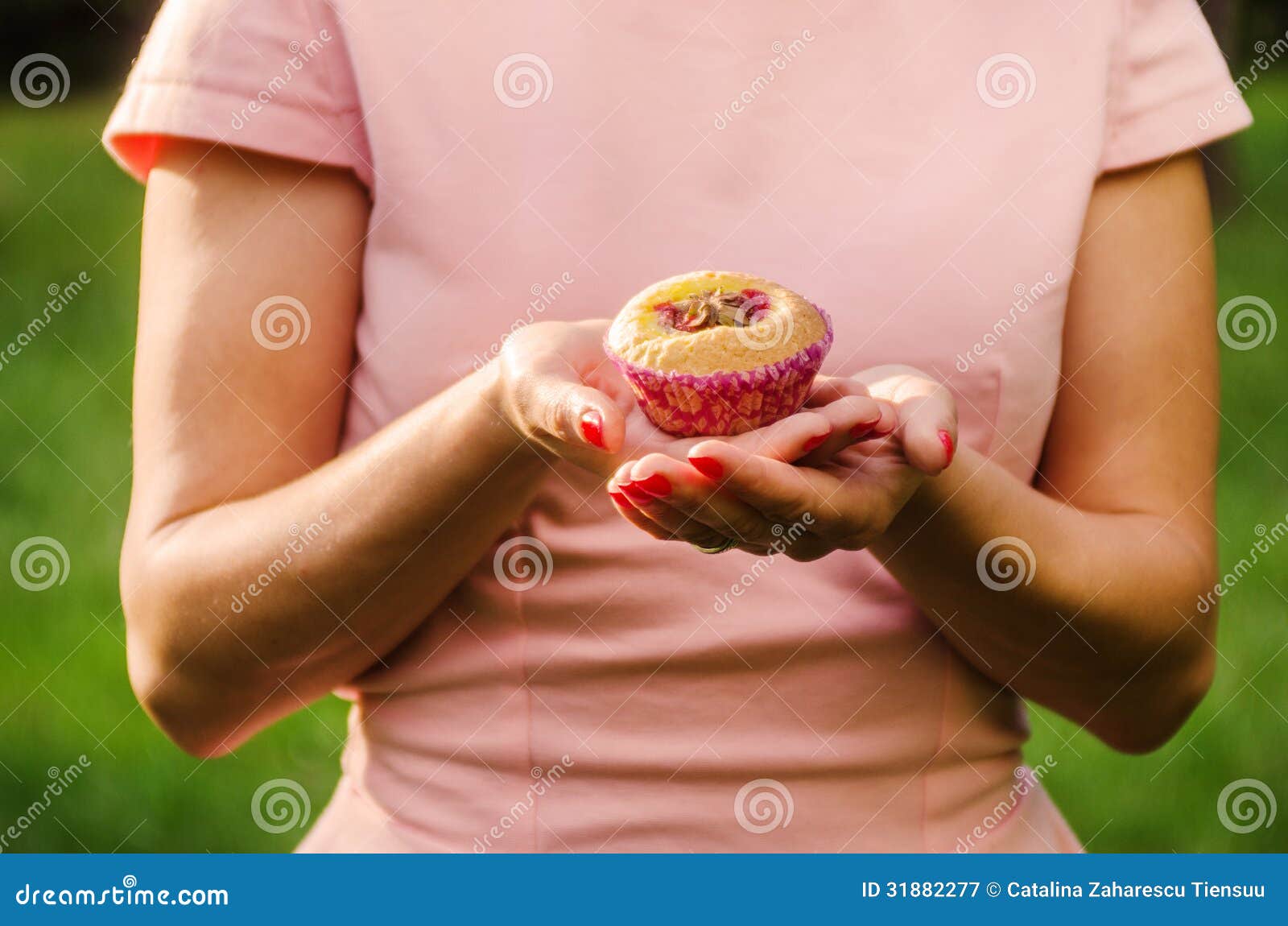Woman Hands Holding Cupcake Stock Image - Image of nails, strawberry ...