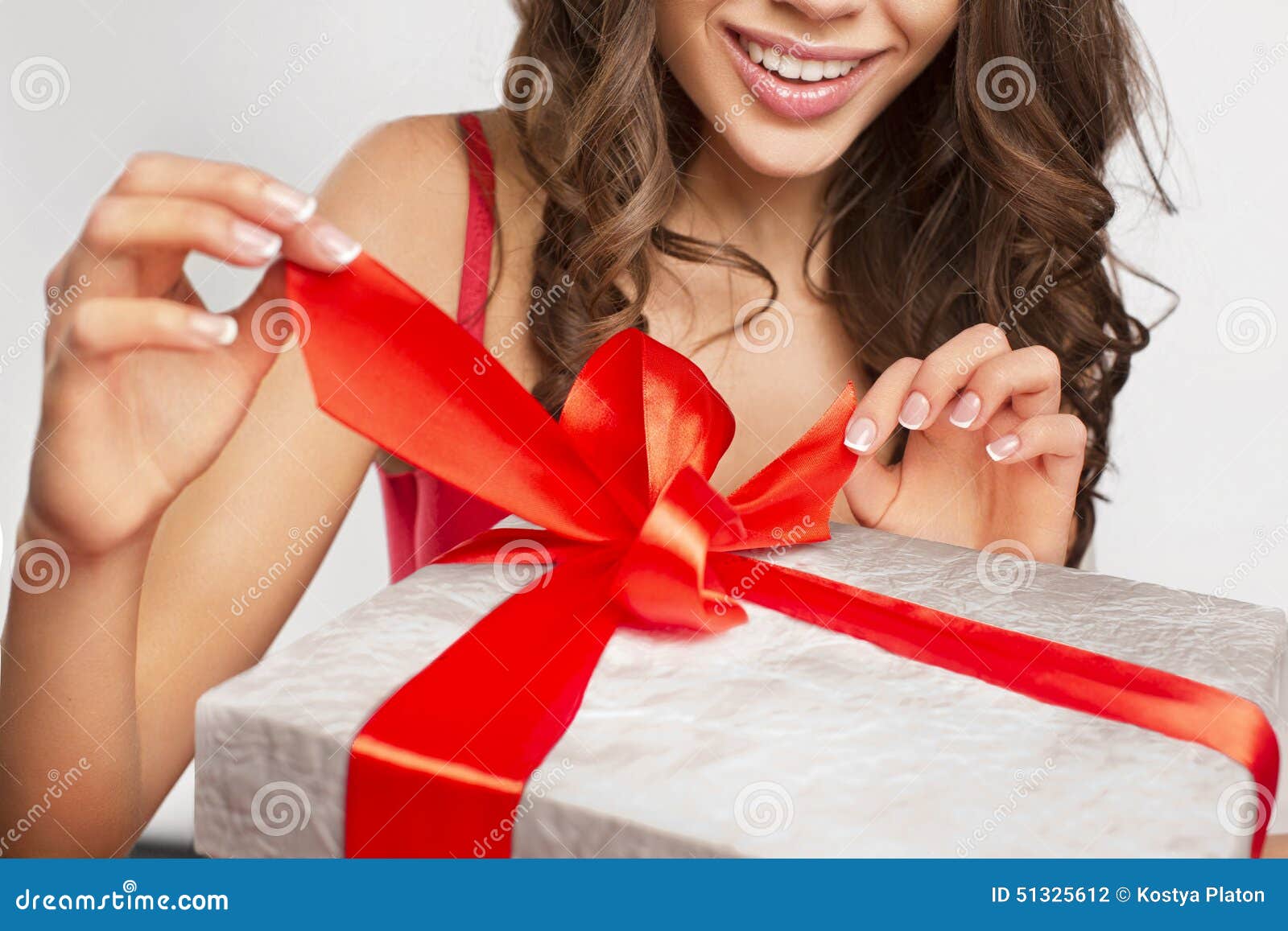 Woman hands holding gift stock photo. Image of beautiful - 51325612
