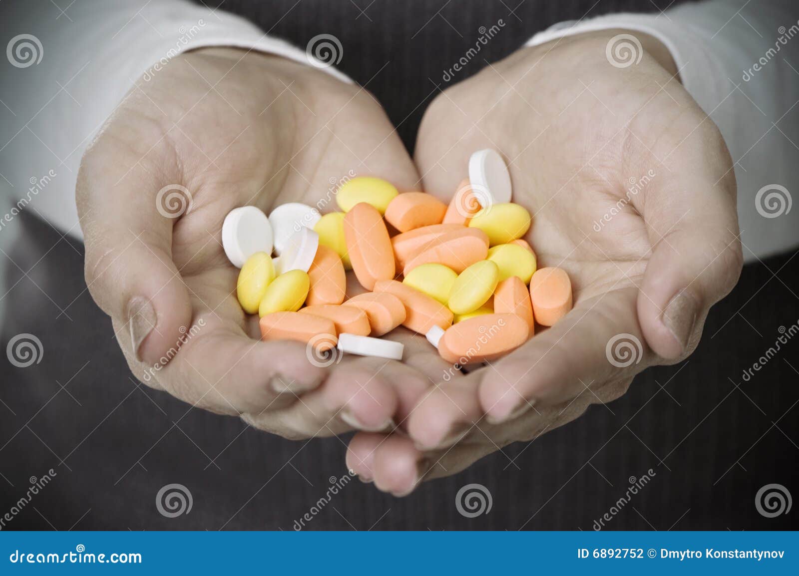 Woman hands holding pills stock photo. Image of hands - 6892752