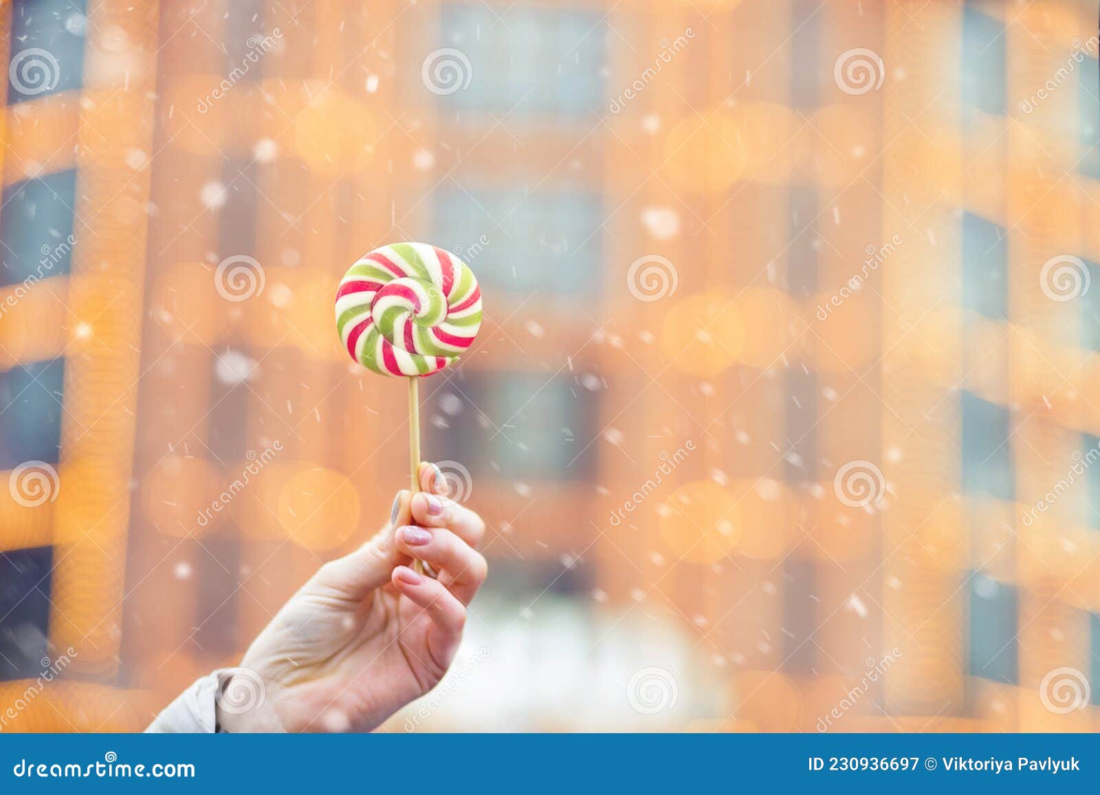 Woman Hands Holding Sweet Candy during the Snowfall Stock Image - Image ...