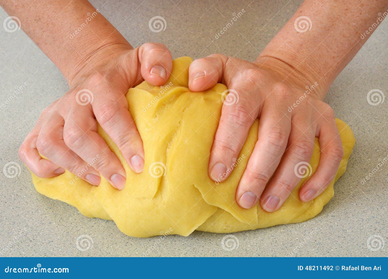 Woman hands kneading dough stock photo. Image of bake - 48211492