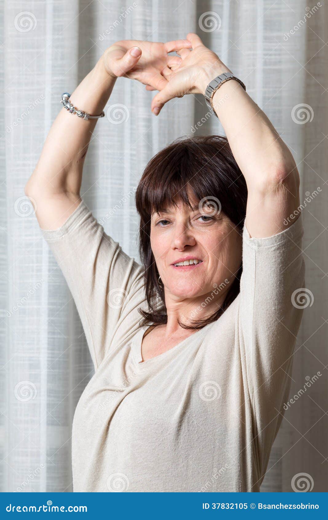 Woman Hands Over His Head Grabs Stock Image - Image of beautiful ...