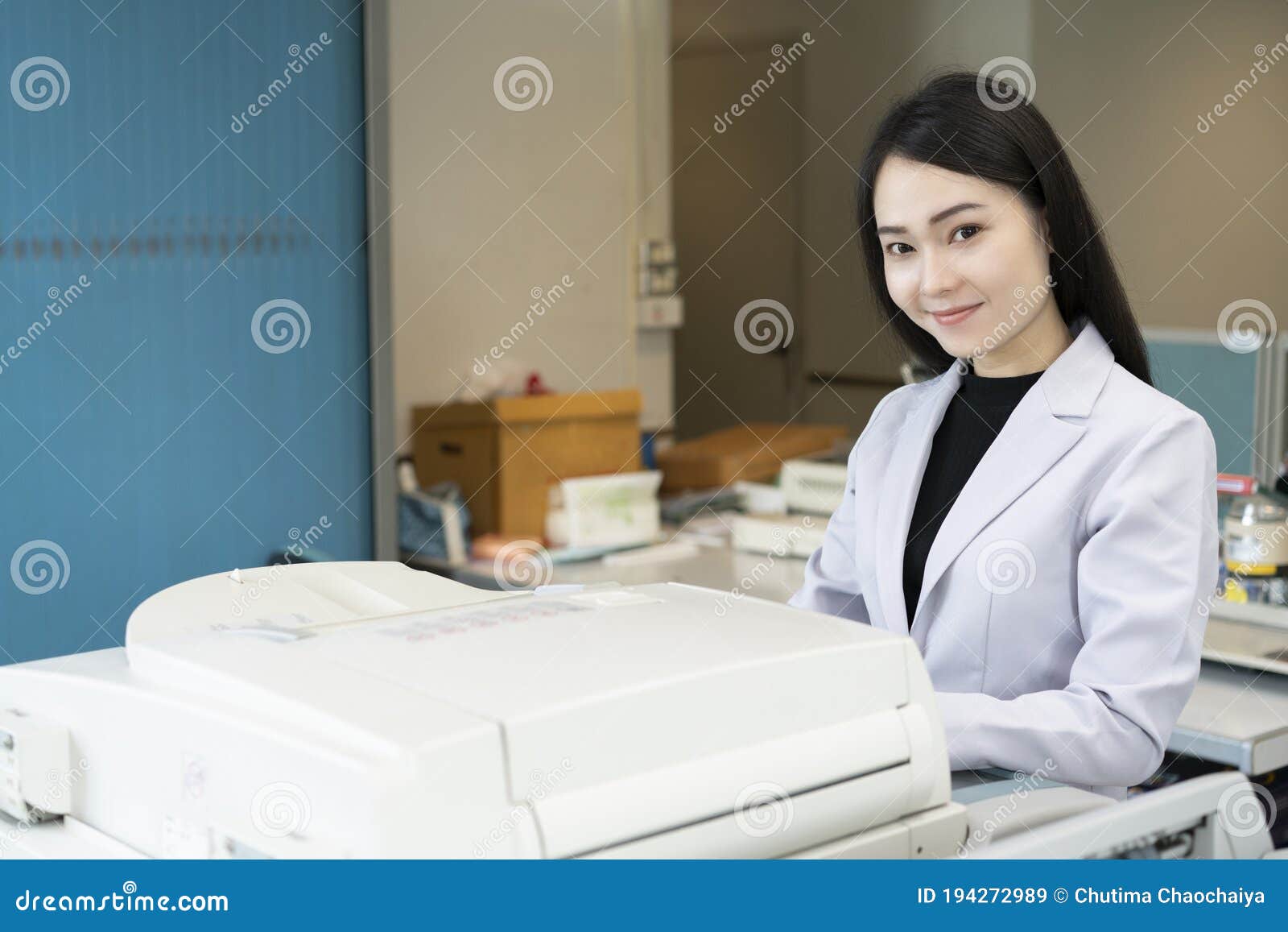 Woman Hands Putting a Sheet of Paper into a Copying Device or Printer ...