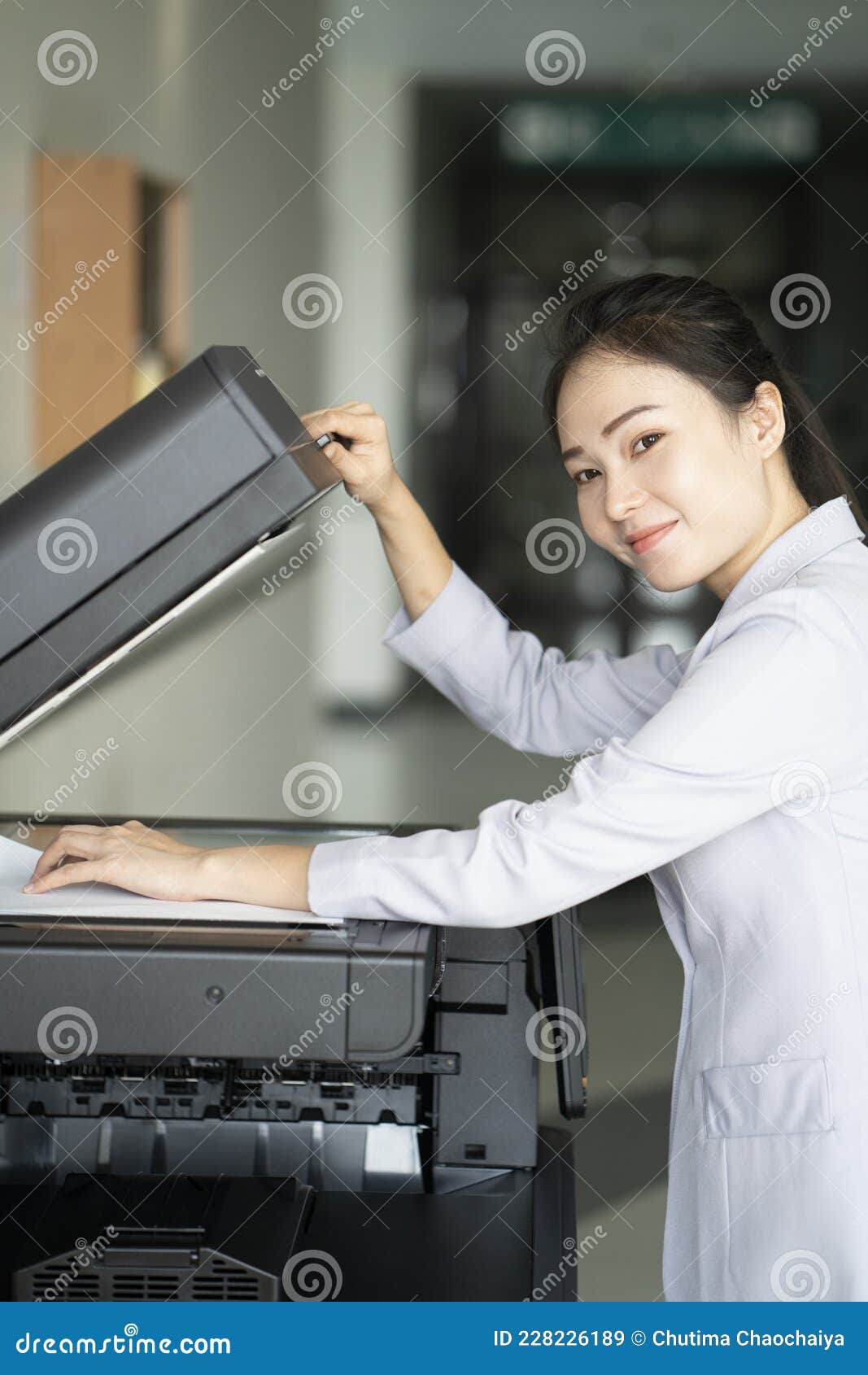 Woman Hands Putting a Sheet of Paper into a Copying Device or Printer ...