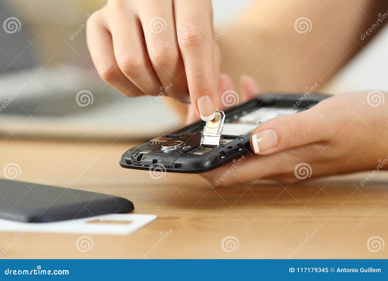 Woman Hands Putting the Sim Card on the Phone Stock Image - Image of ...