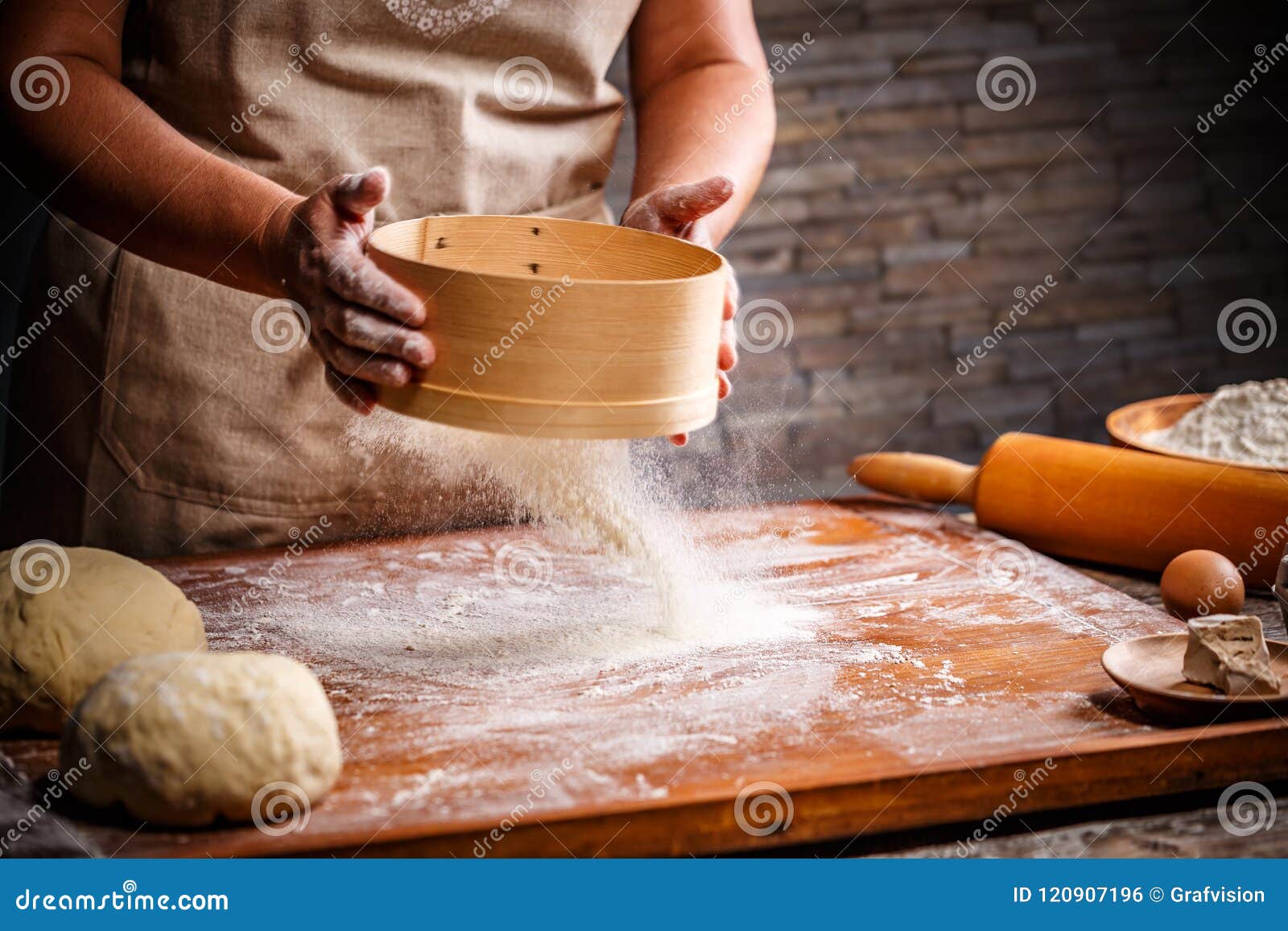 Woman hands sifting flour stock photo. Image of baker - 120907196