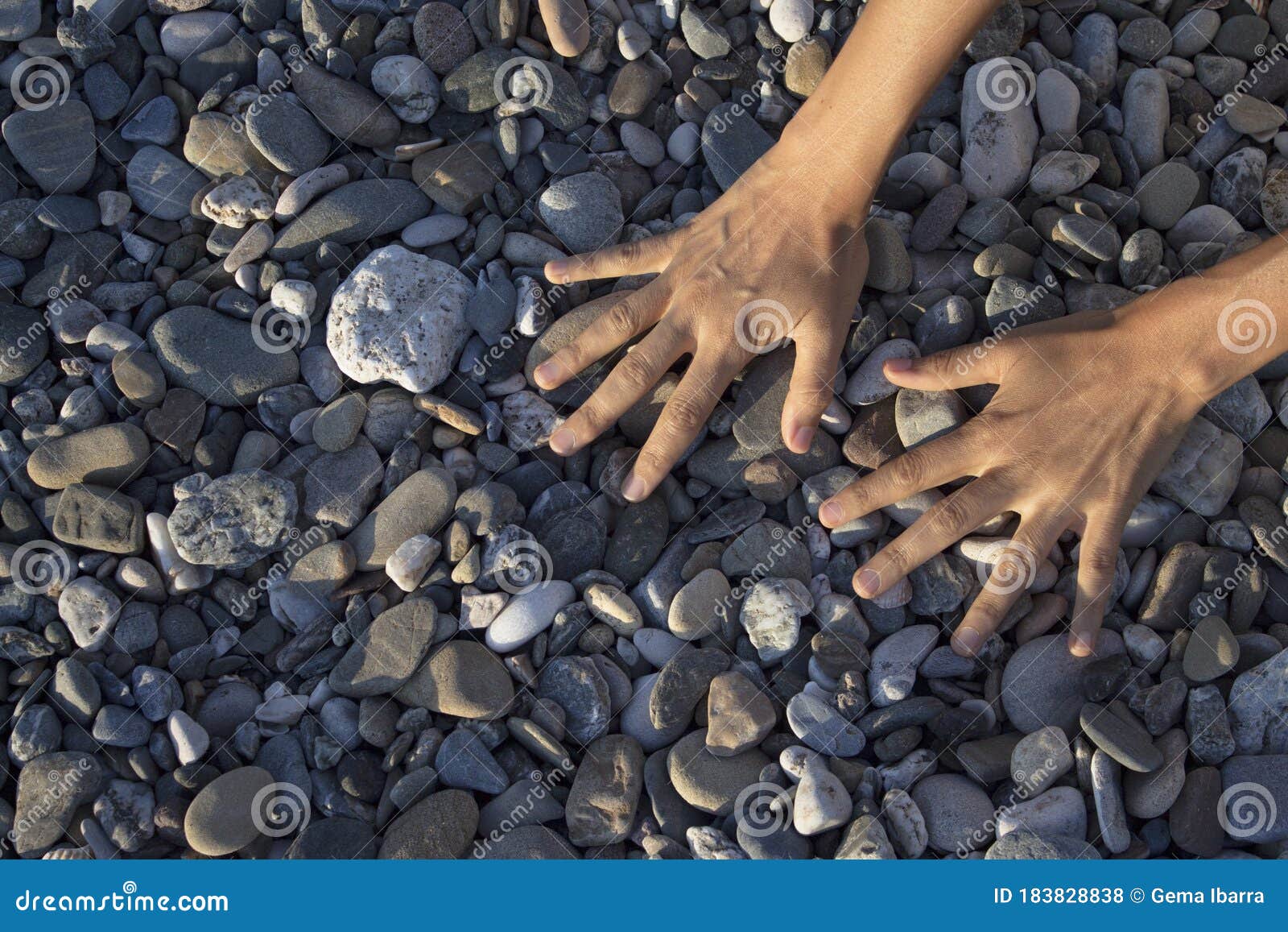 Woman Hands Touching Stones on the Beach Stock Photo - Image of ...