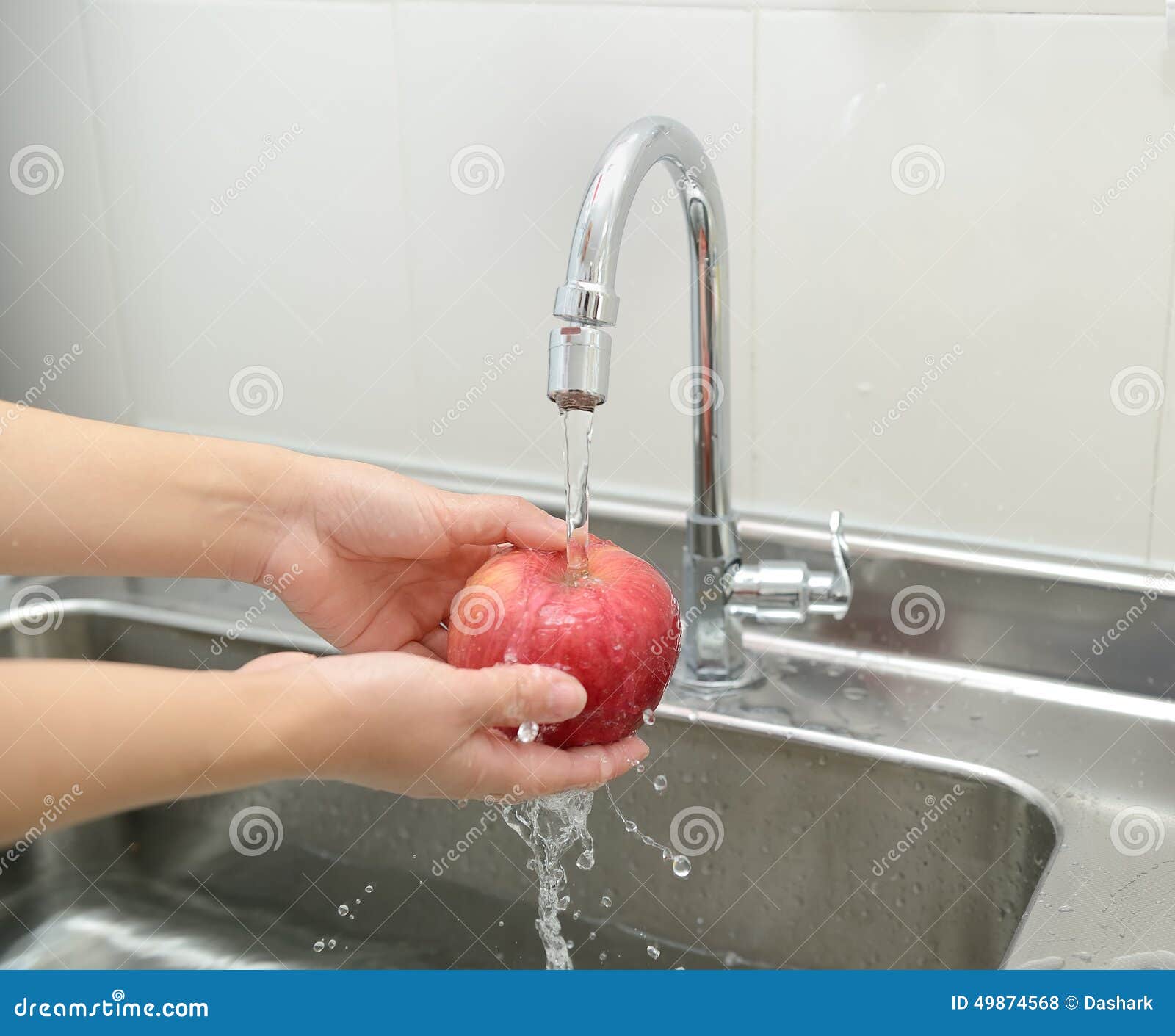 Woman hands washing apple stock photo. Image of healthy - 49874568