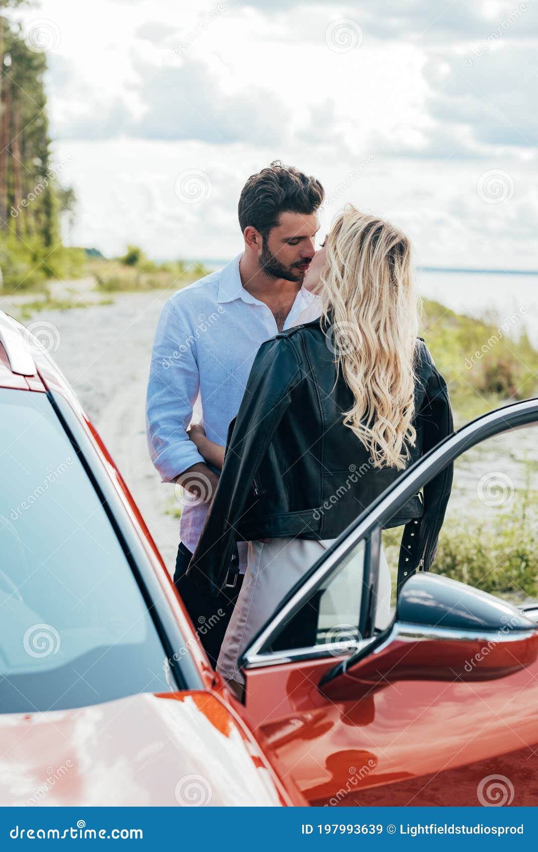 Woman And Handsome Man Kissing And Hugging Near Car Stock Image Image