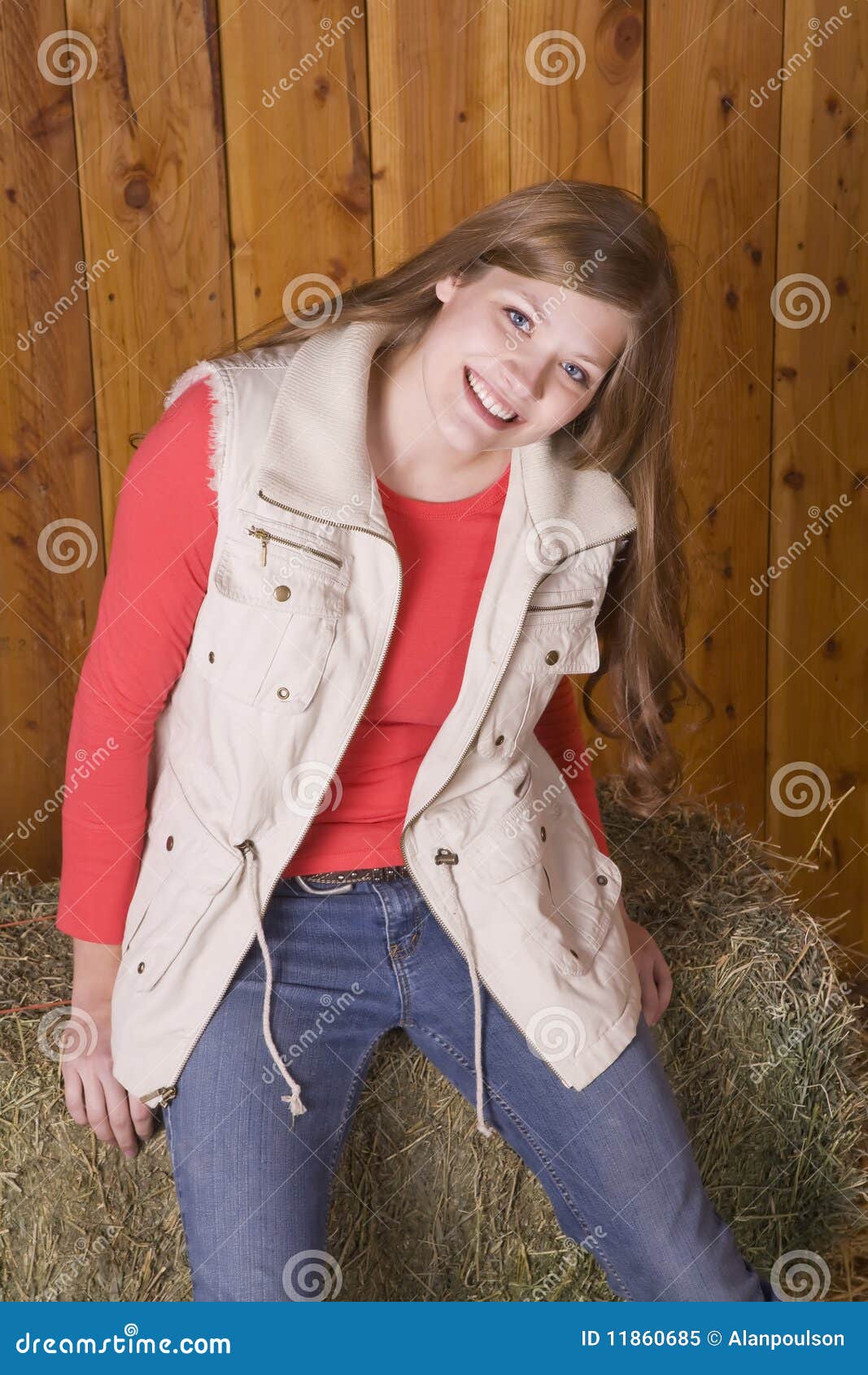 Woman with Happy Expression on Hay Bale Stock Image - Image of hands ...