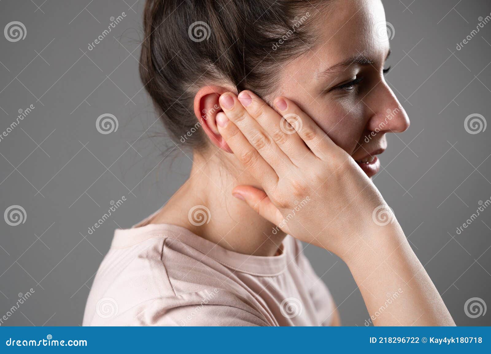 The woman has a sore ear stock photo. Image of hazard - 218296722
