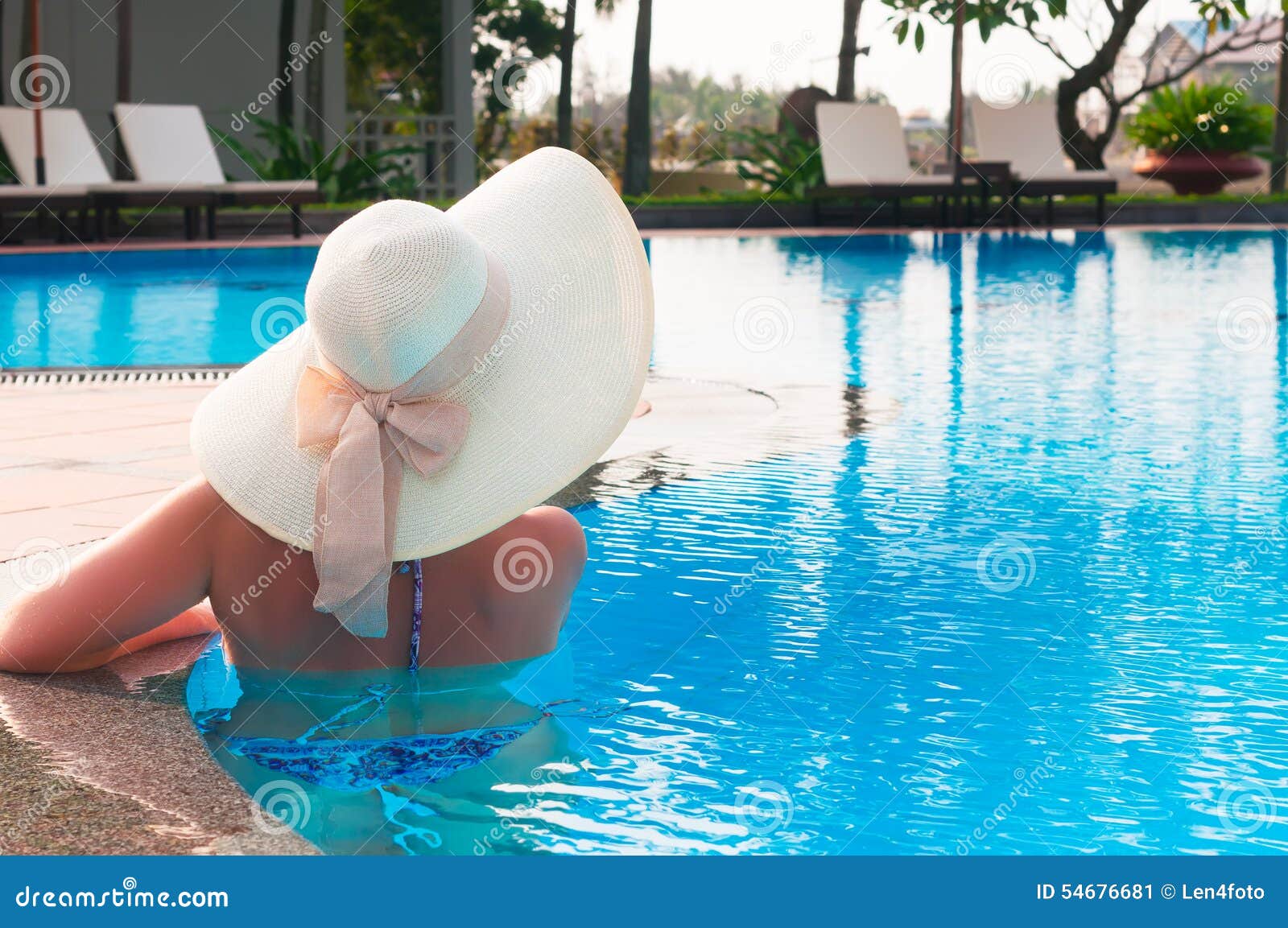 Woman with Hat from Back in Swimming Pool Stock Image - Image of ...