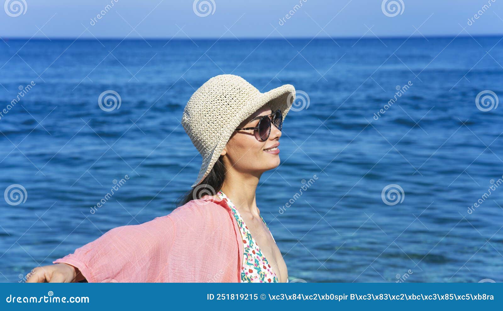 Woman in hat on the beach stock image. Image of nature - 251819215