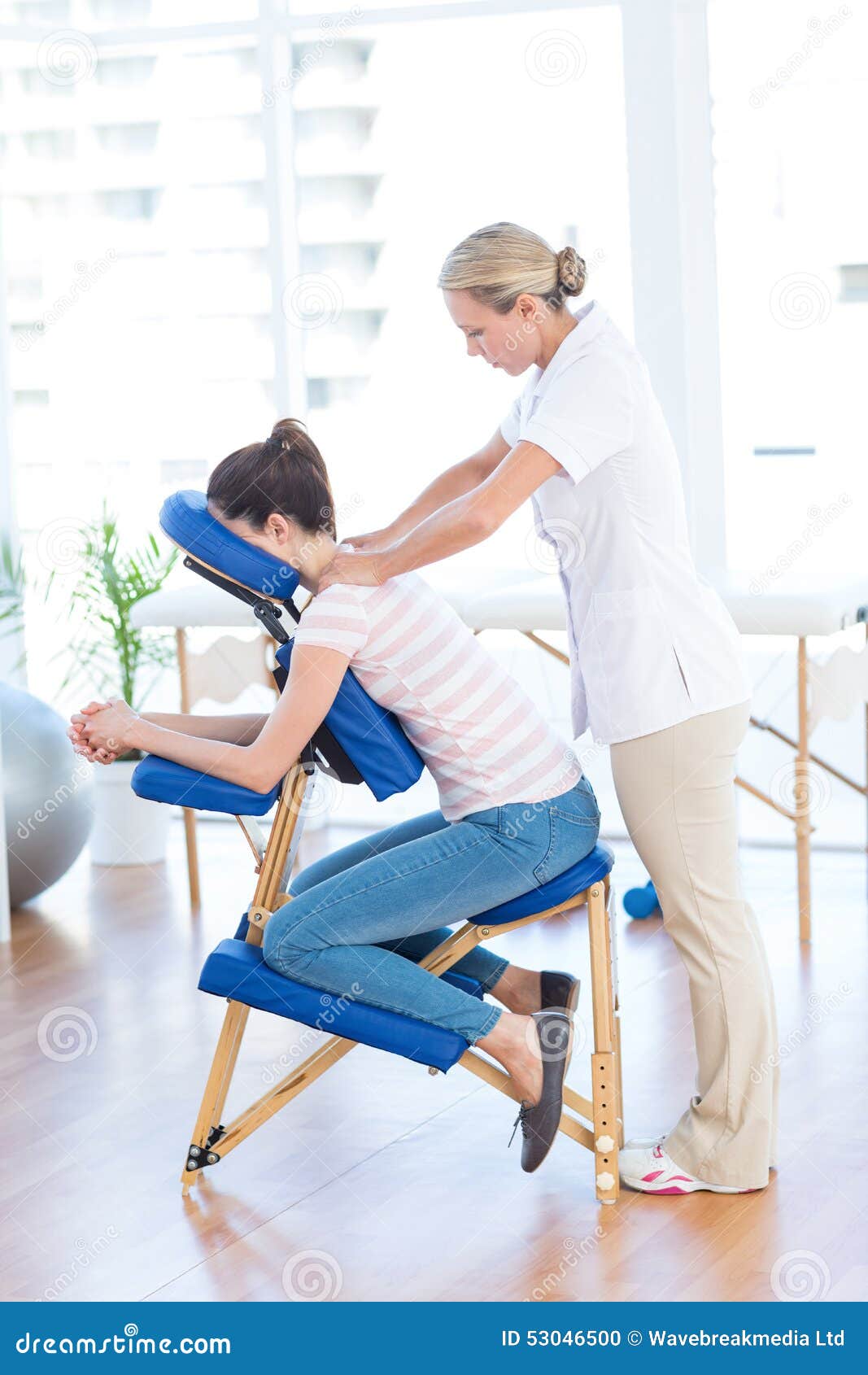 Woman having back massage stock photo. Image of pressure - 53046500