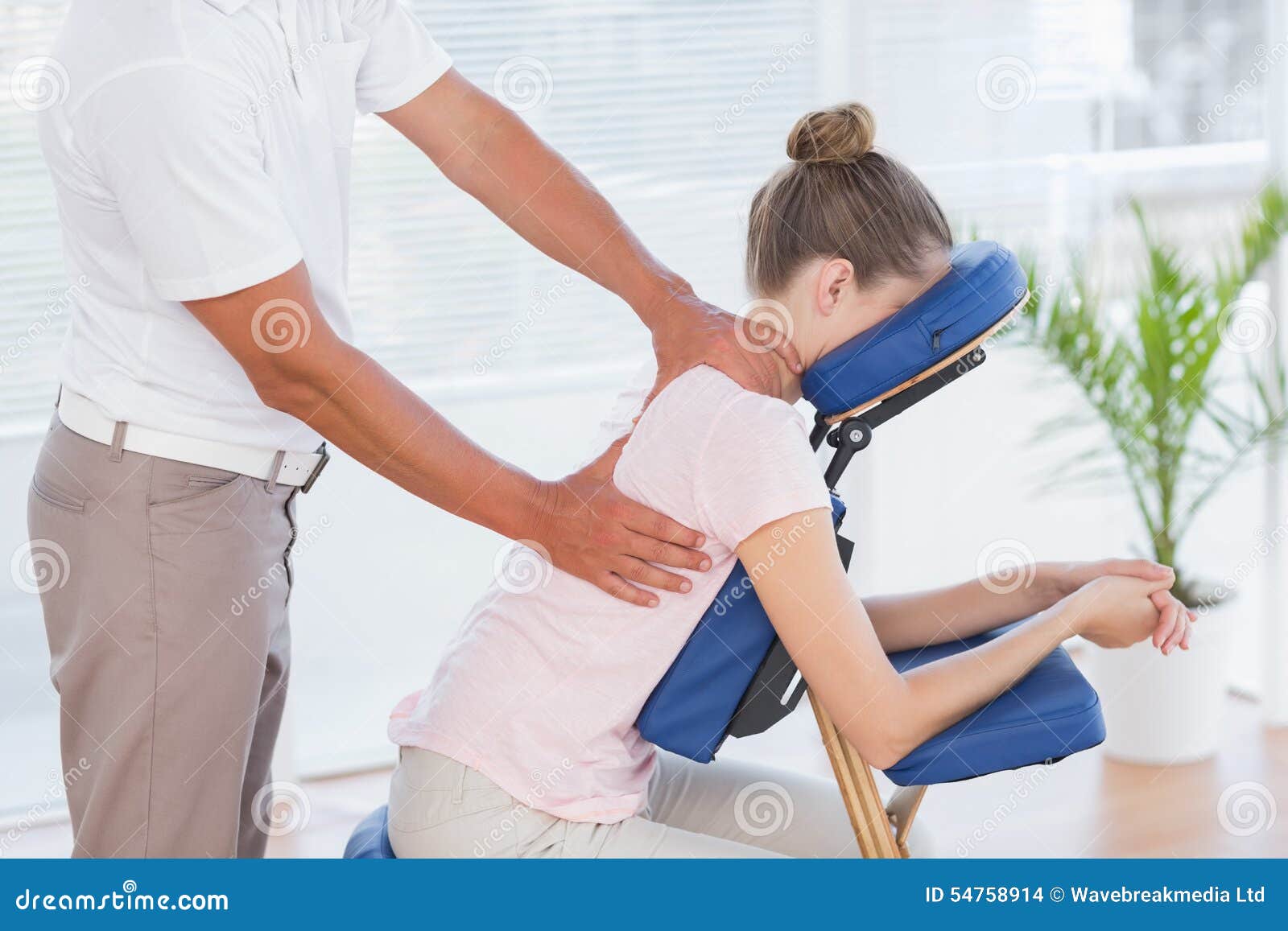 Woman having back massage stock photo. Image of physiotherapy - 54758914