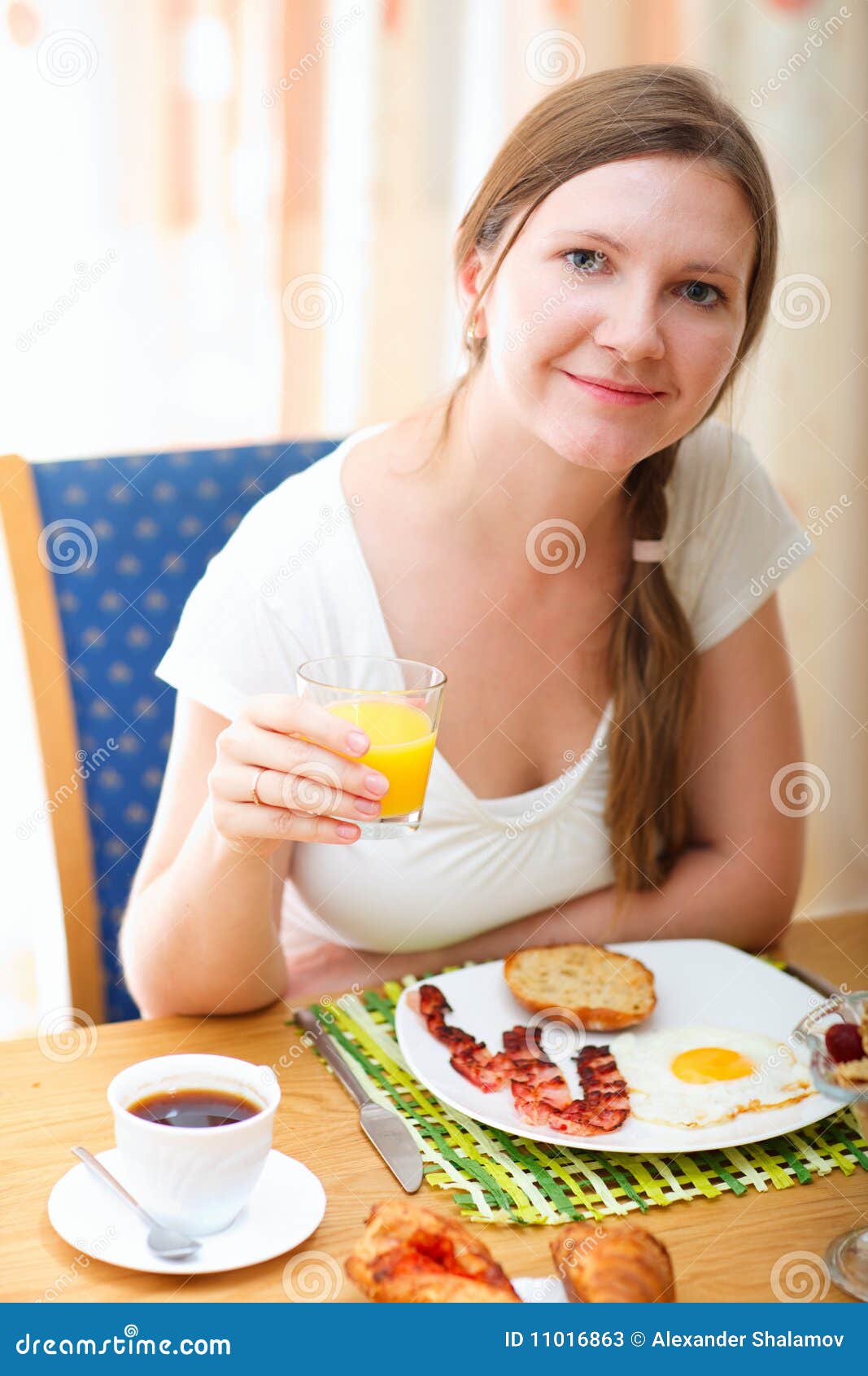 Woman having breakfast stock image. Image of food, home - 11016863