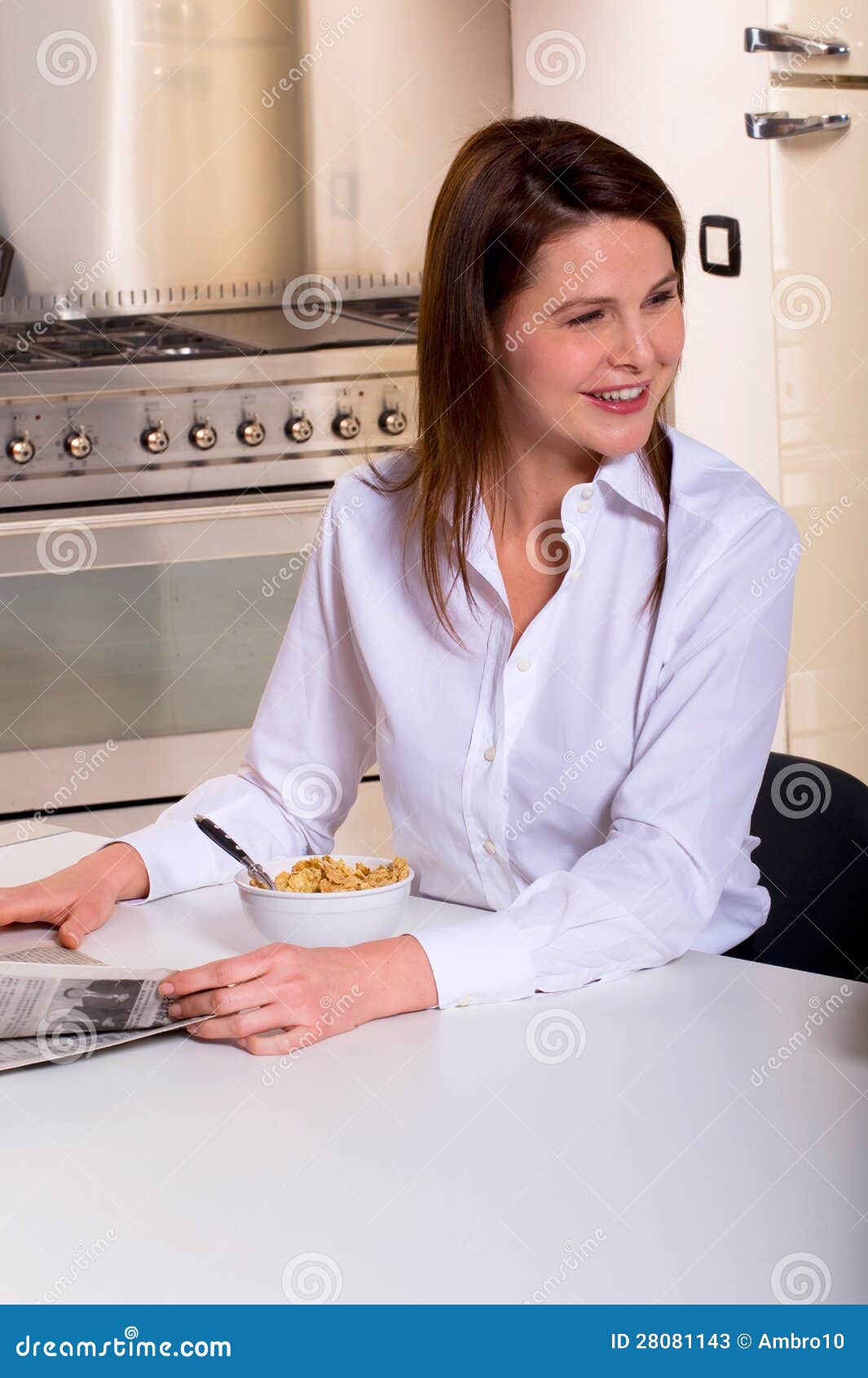 Woman Having Breakfast and Reading Newspaper Stock Image - Image of ...