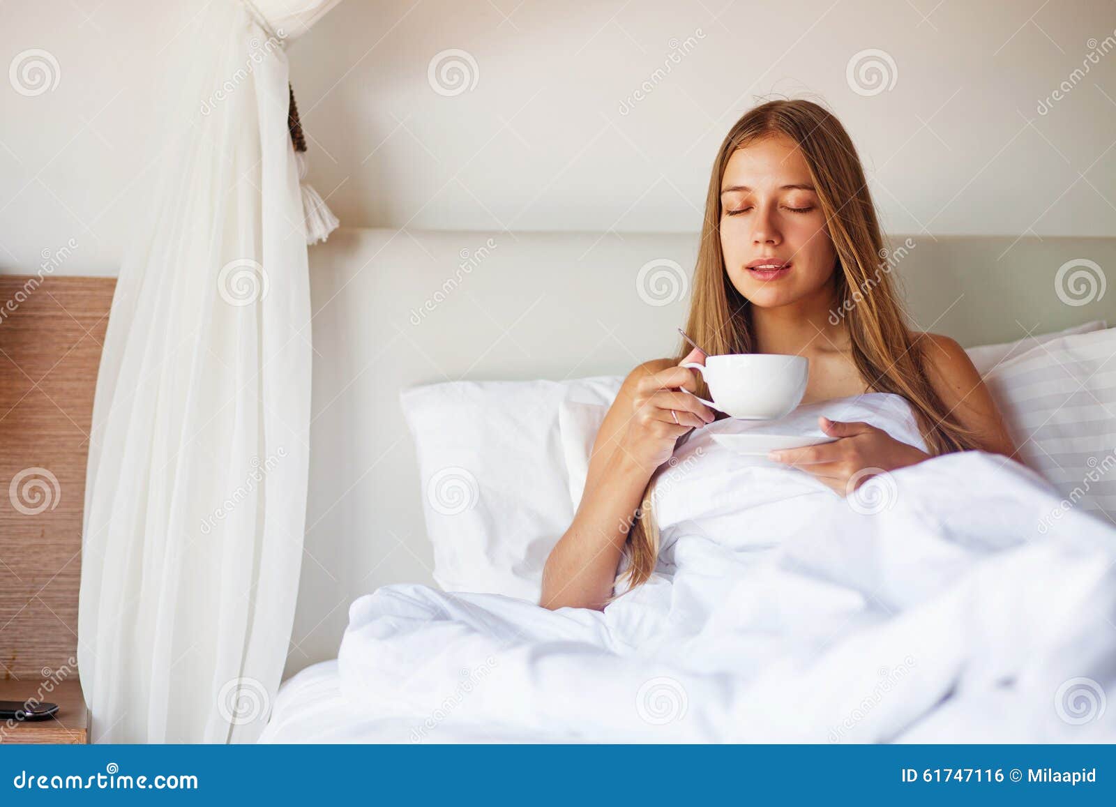 Woman Having Coffee in a Bed Stock Photo - Image of bedroom, interior ...