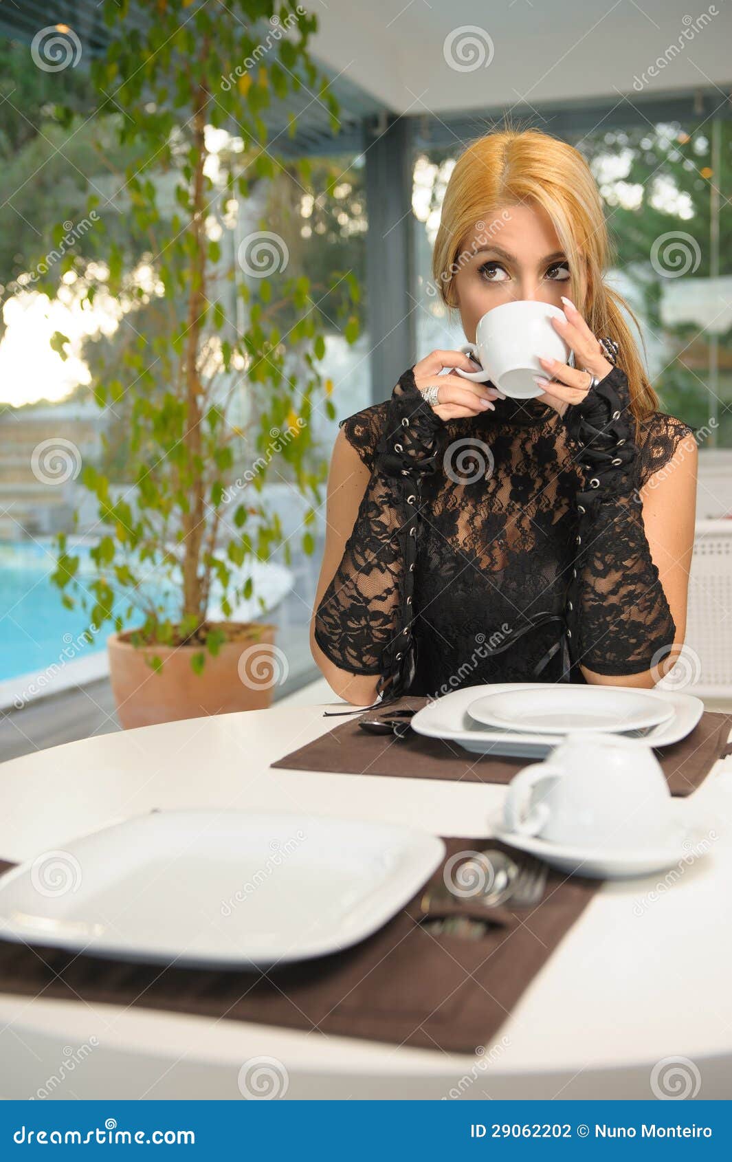 Woman Having Coffee in the Morning Stock Photo - Image of blond, drink ...
