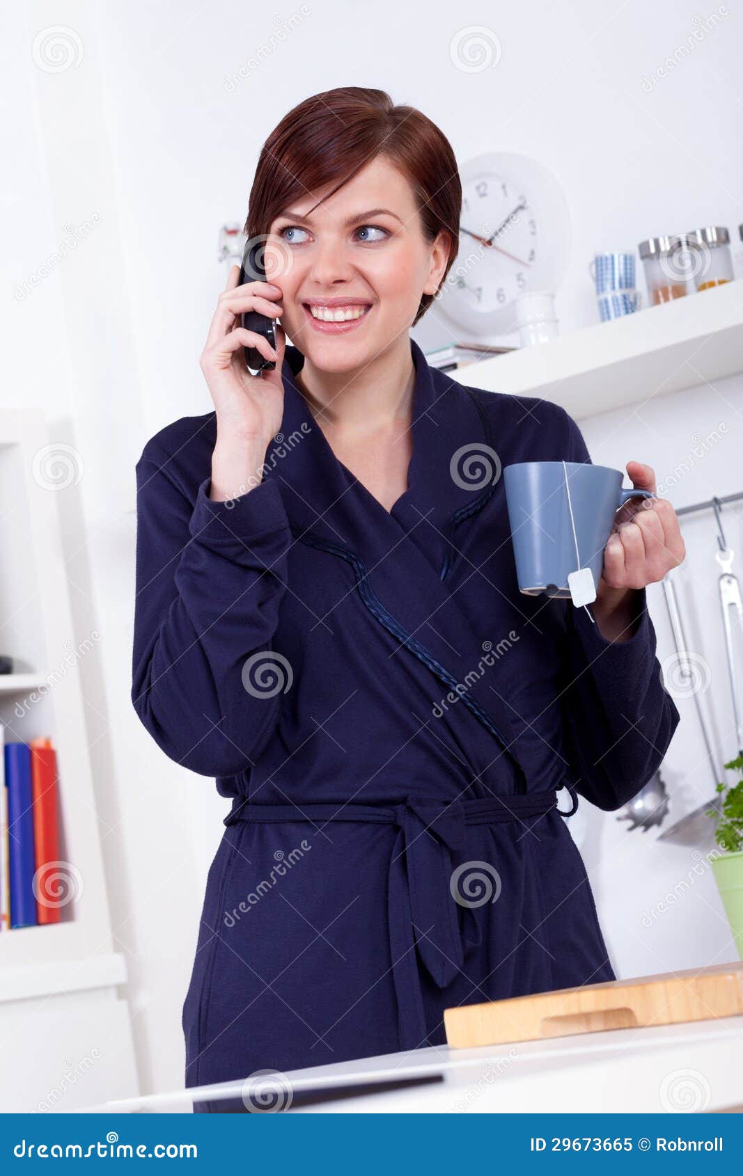 Woman Having a Cup of Tea and Talking on the Phone Stock Image - Image ...