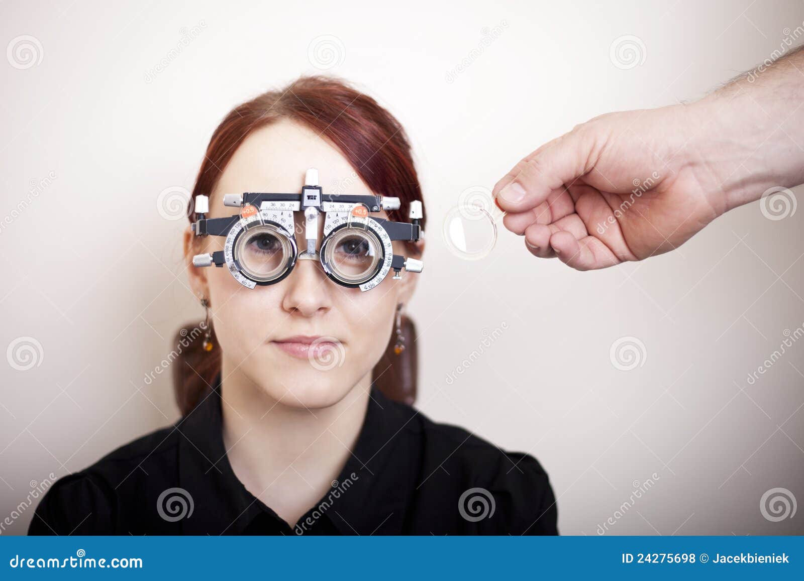 Woman having eye exam stock photo. Image of optician - 24275698