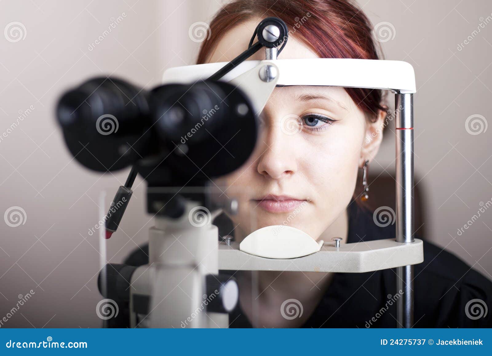 Woman having eye exam stock image. Image of optometrist - 24275737