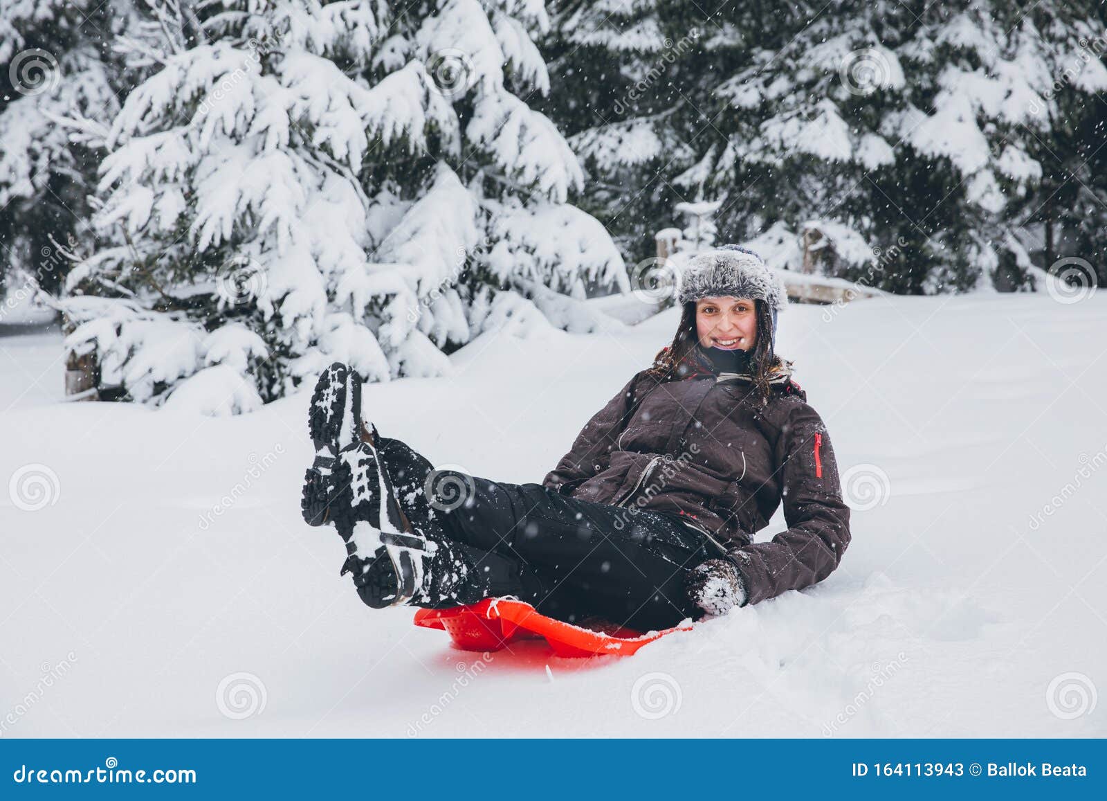 Woman Having Fun in Heavy Snow with a Sleigh Stock Image - Image of ...
