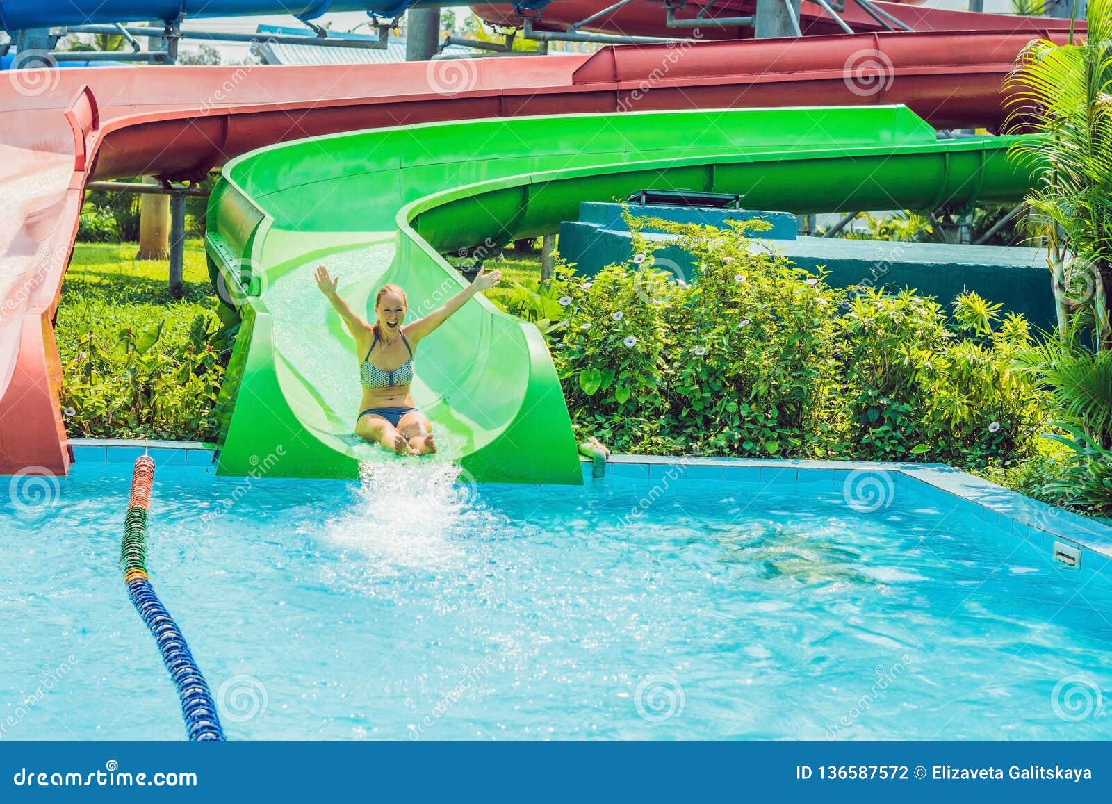 Woman is Having Fun in the Water Park Stock Photo - Image of active ...