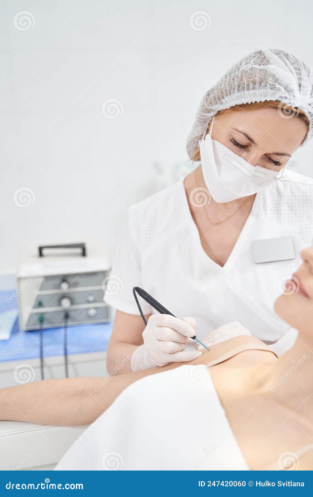 Electrocoagulation And Laser Cosmelotogy Dermatologist Using A