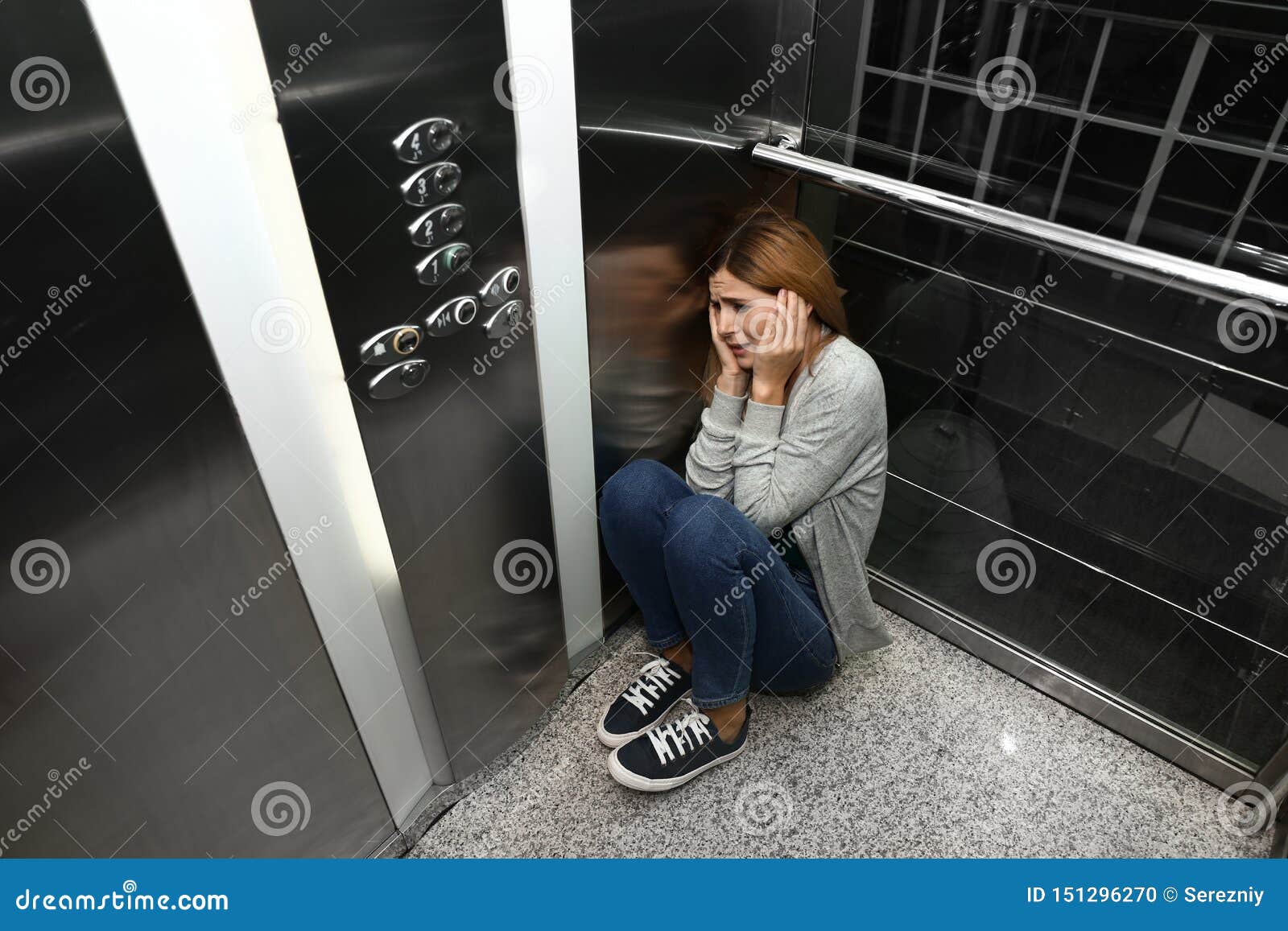 Woman Having Panic Attack in Elevator Stock Photo - Image of frightened ...
