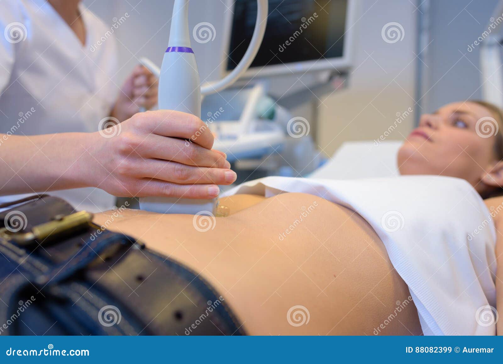Woman having scan abdomen stock image. Image of abdomen - 88082399