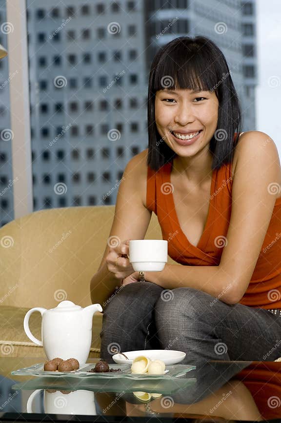 Woman Having Tea stock photo. Image of sitting, female - 2031268