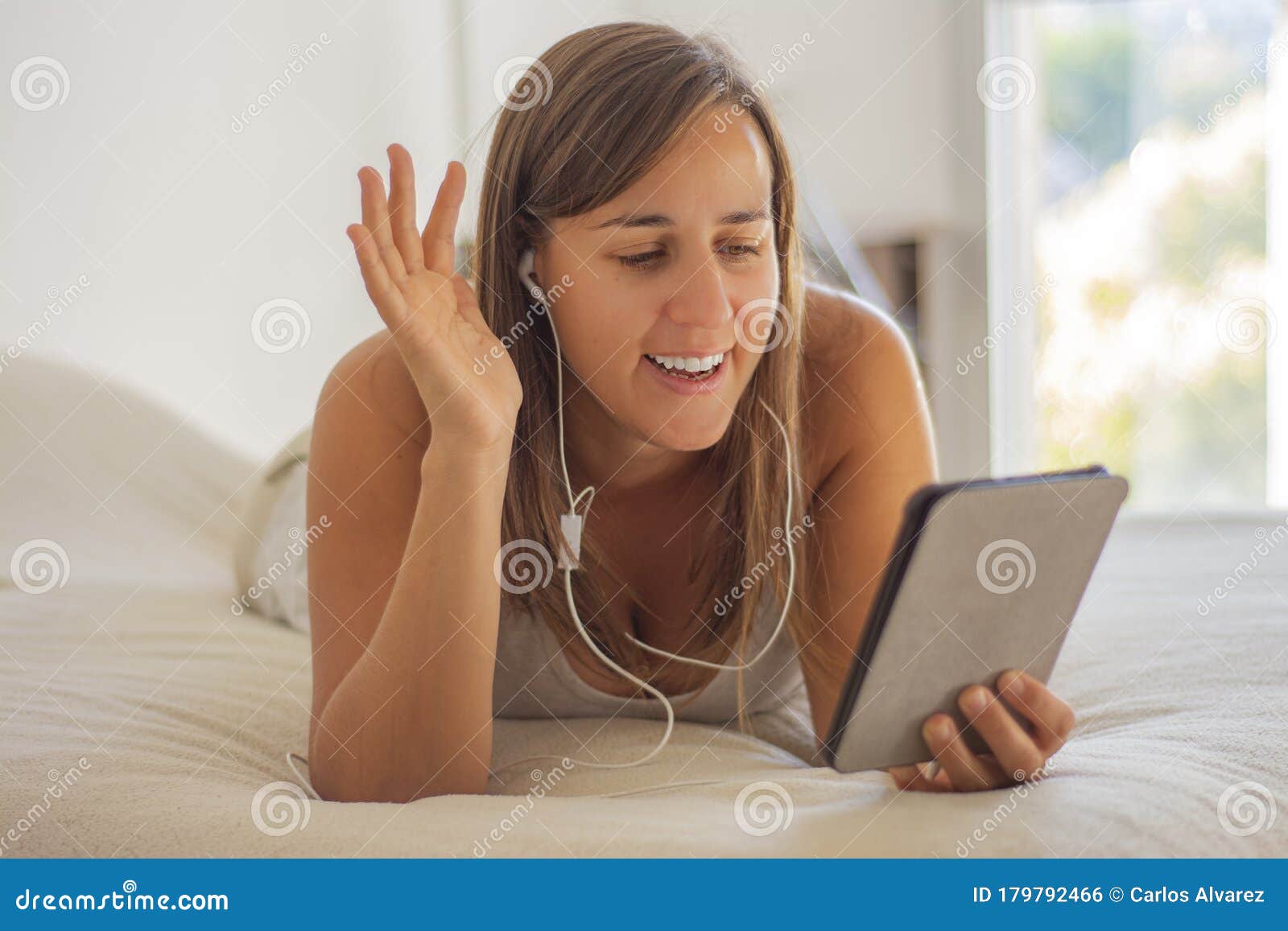 Woman Having a Video Call at Bed Stock Photo - Image of hobby, home ...