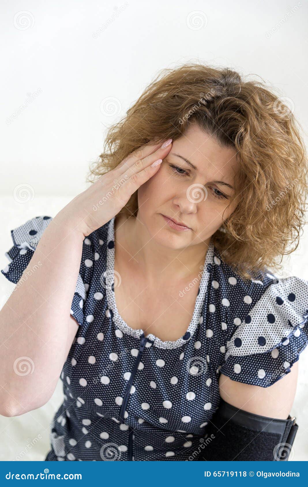 Woman with Headache Measures Blood Pressure Stock Photo - Image of ...