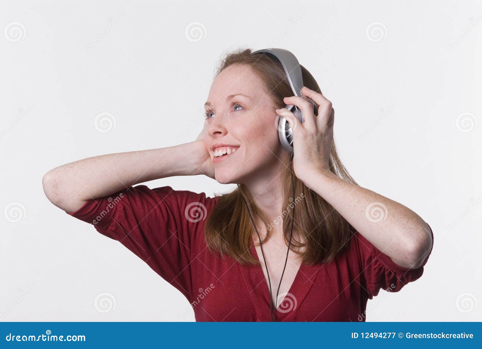 Woman with headphones-01 stock image. Image of horizontal - 12494277