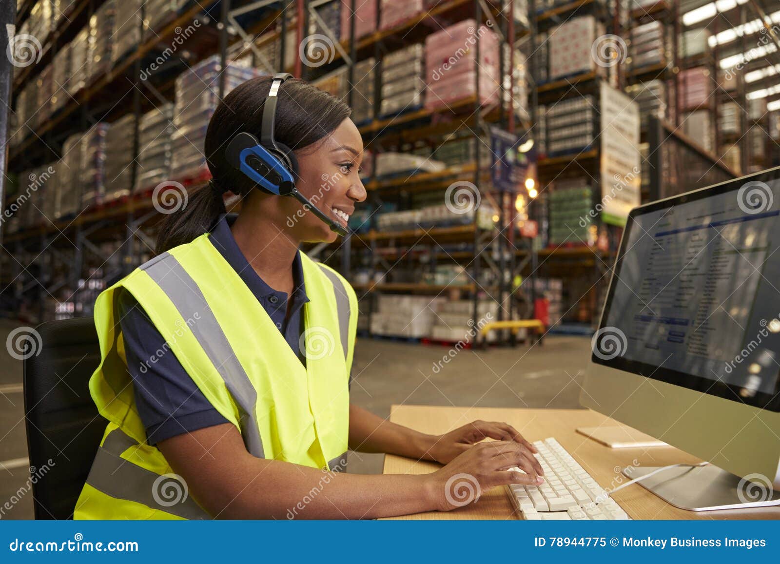 Woman with Headset Working in on-site Office of a Warehouse Stock Image ...