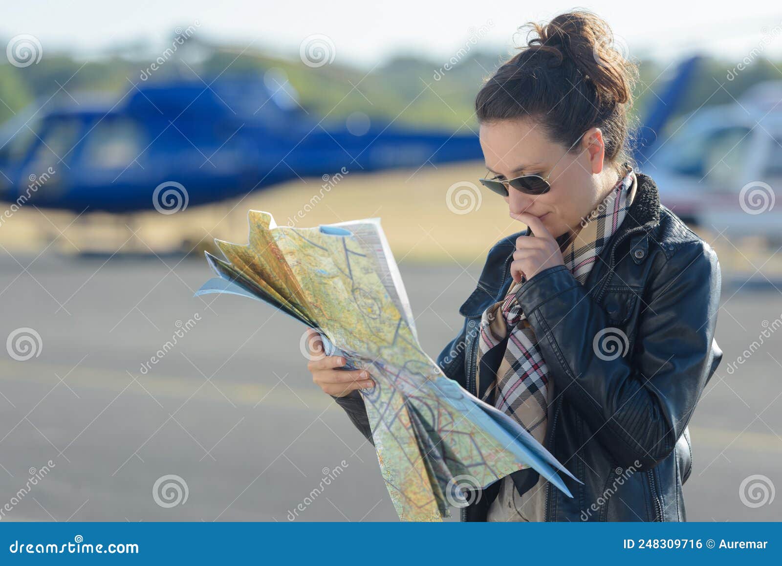Woman Helicopter in Background Pilot Reading Map Stock Photo - Image of ...