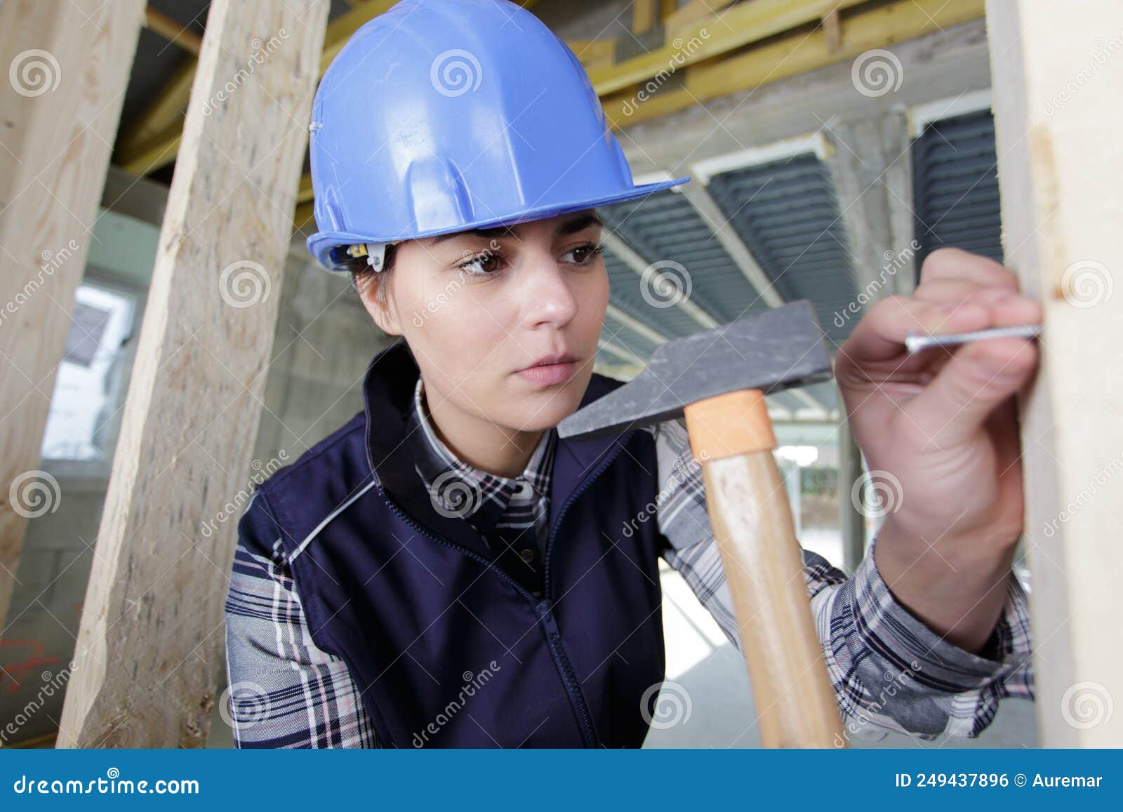 Woman with Helmet Holding Hammer in Hand Stock Photo - Image of eyes ...