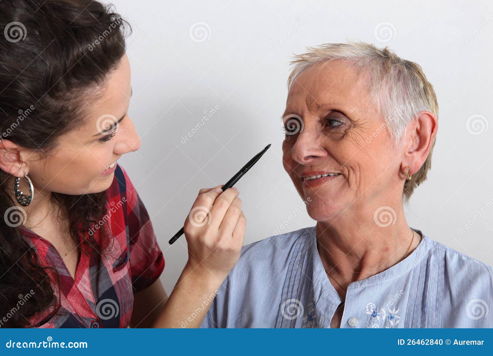 Woman Helping To Apply Make-up Stock Photo - Image of makeup ...