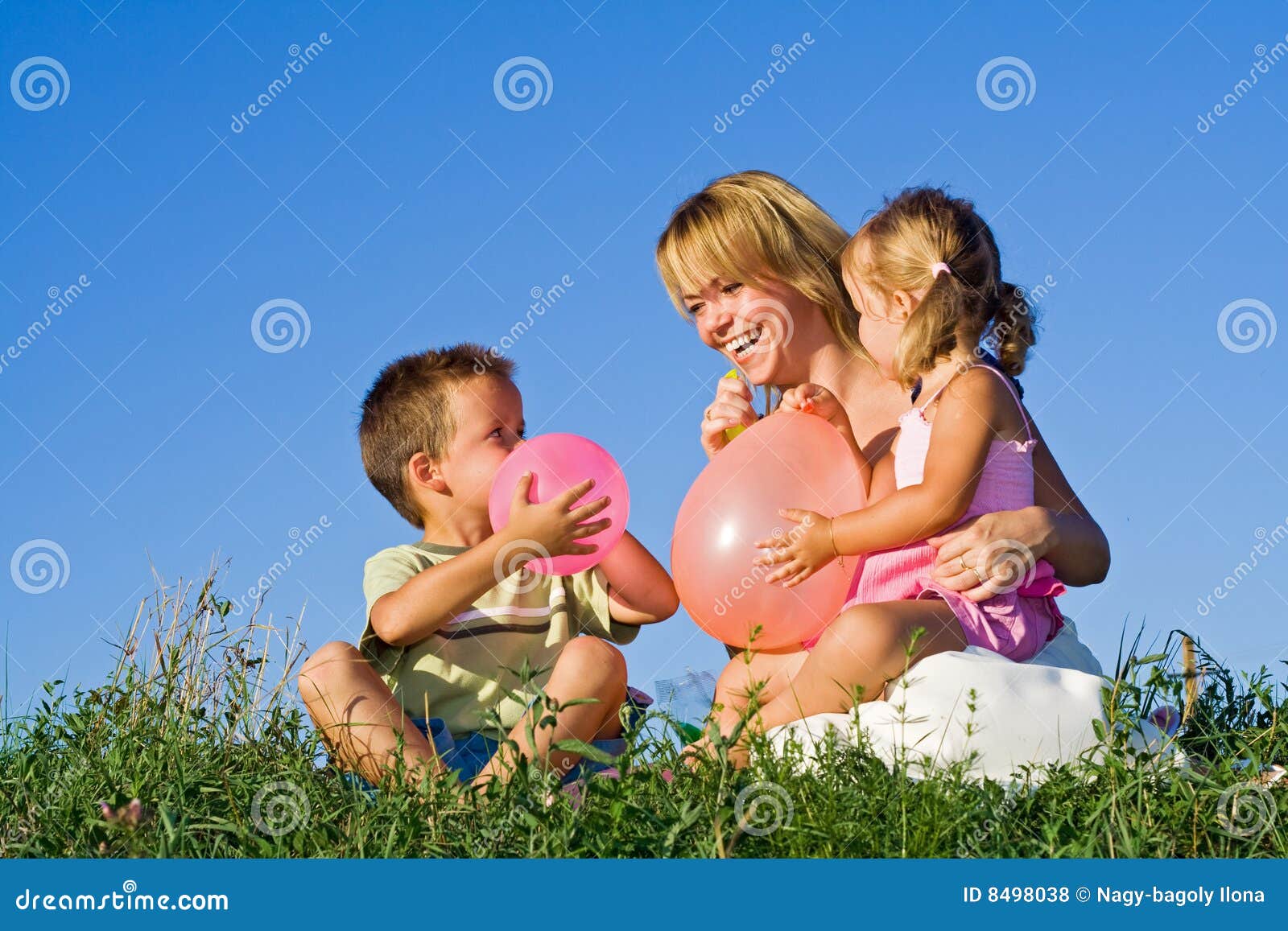 Woman and her kids playing stock photo. Image of mother - 8498038