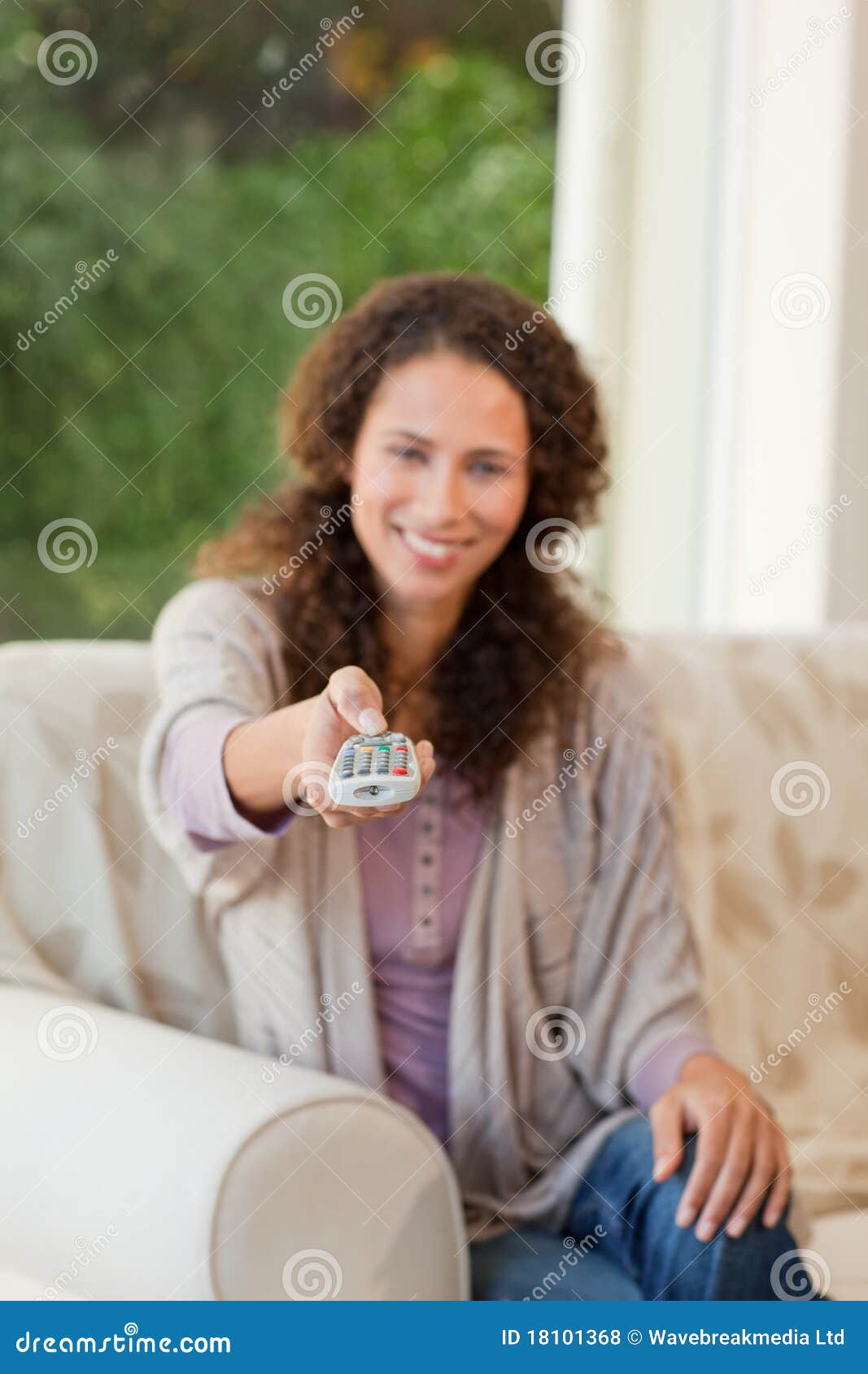 Woman with her remote stock photo. Image of animated - 18101368