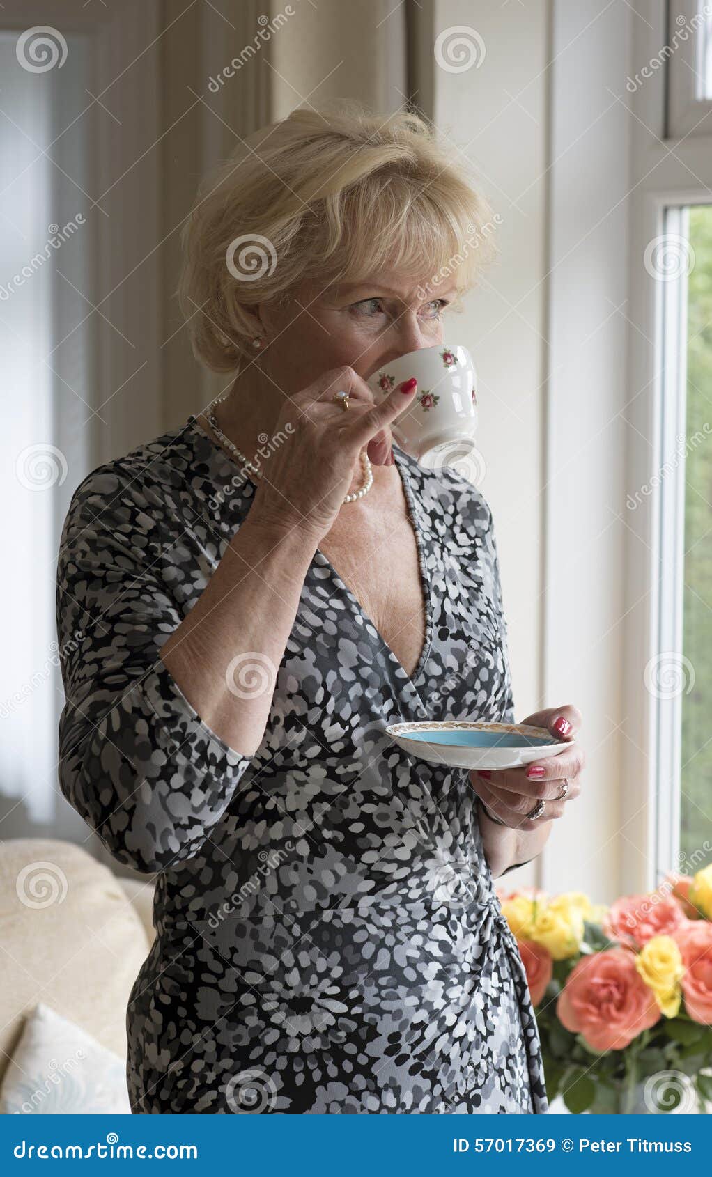 Woman in Her Sixties Standing Drinking Tea Stock Image - Image of ...