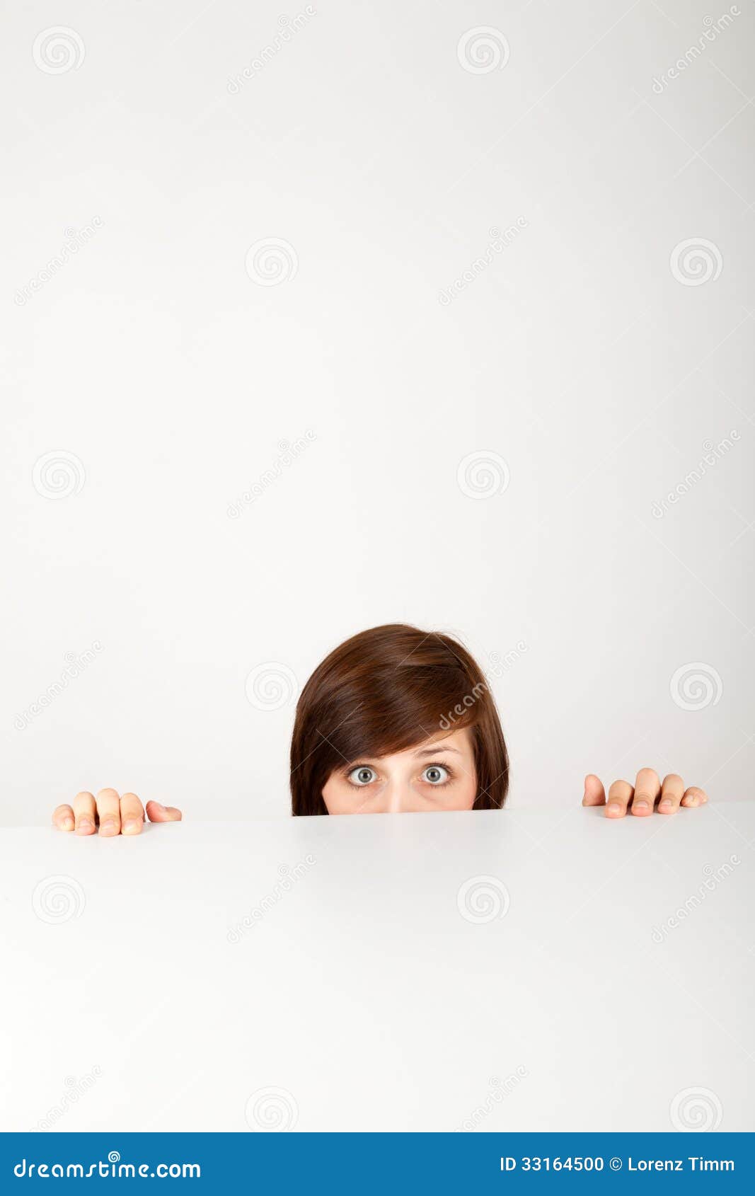 The Woman is Hiding Anxious Behind the Table Stock Photo - Image of ...